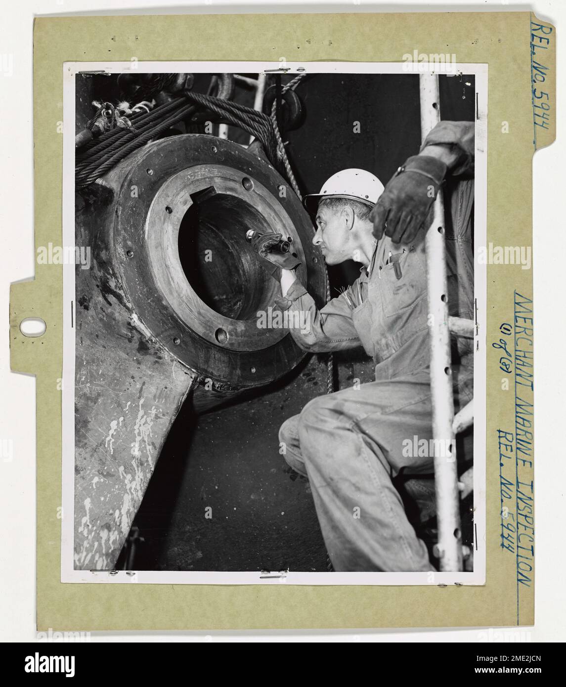 Merchant Marine Inspection. A Coast Guard marine inspector with ...