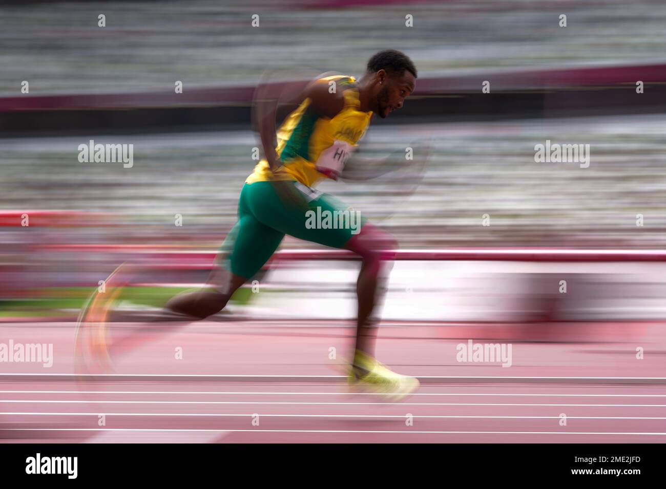 Jaheel Hyde, of Jamaica, wins a heat in the men's 400-meter hurdles at ...