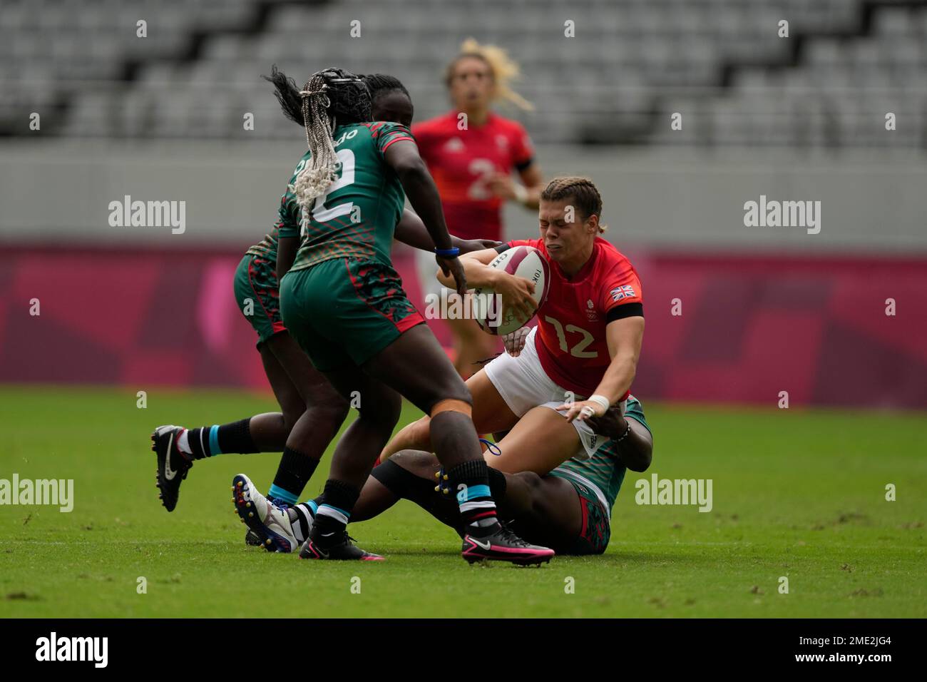Britain's Helena Rowland is brought down with a tackle by Kenya's ...