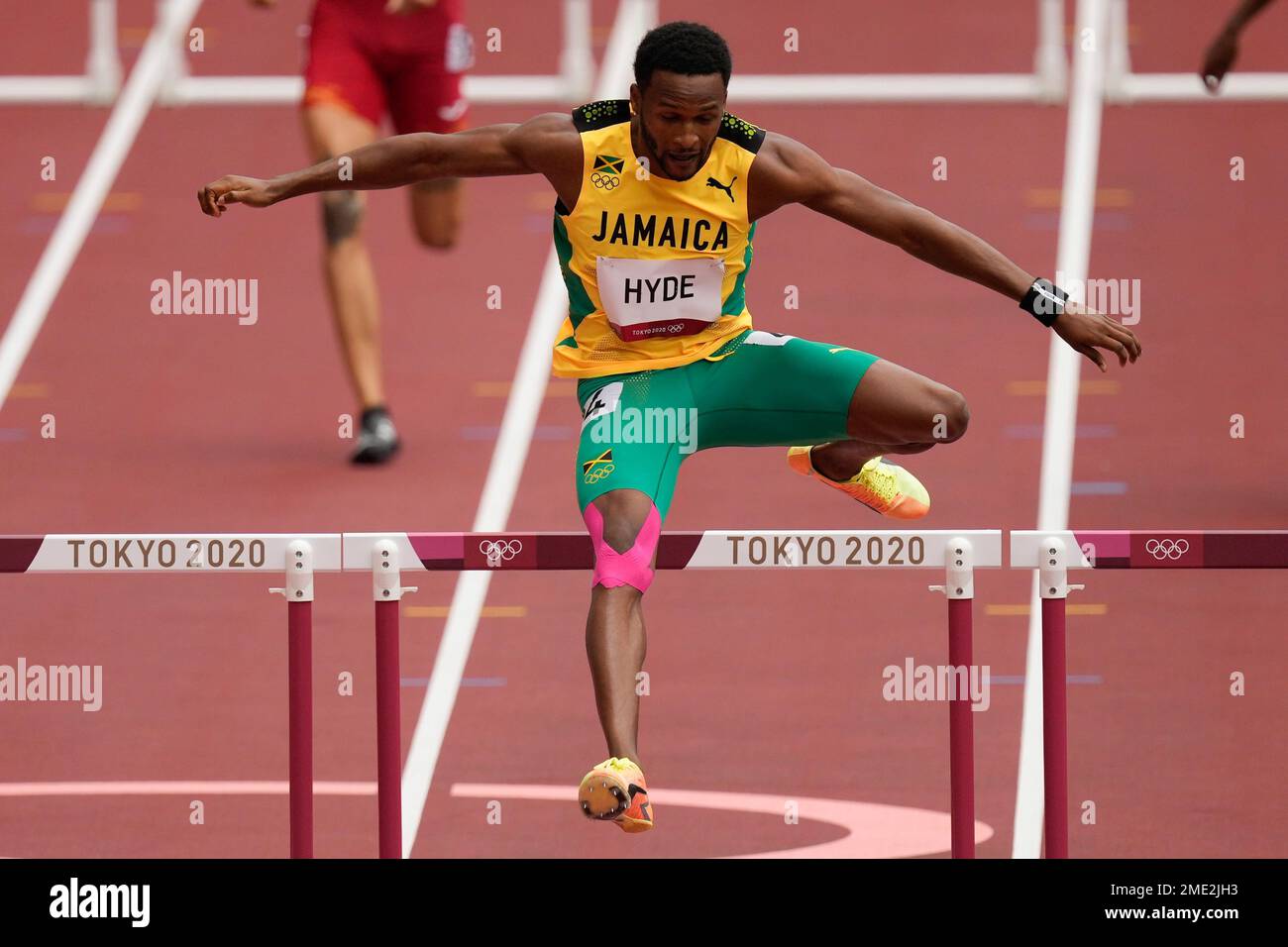 Jaheel Hyde, of Jamaica, wins a heat in the men's 400-meter hurdles at ...