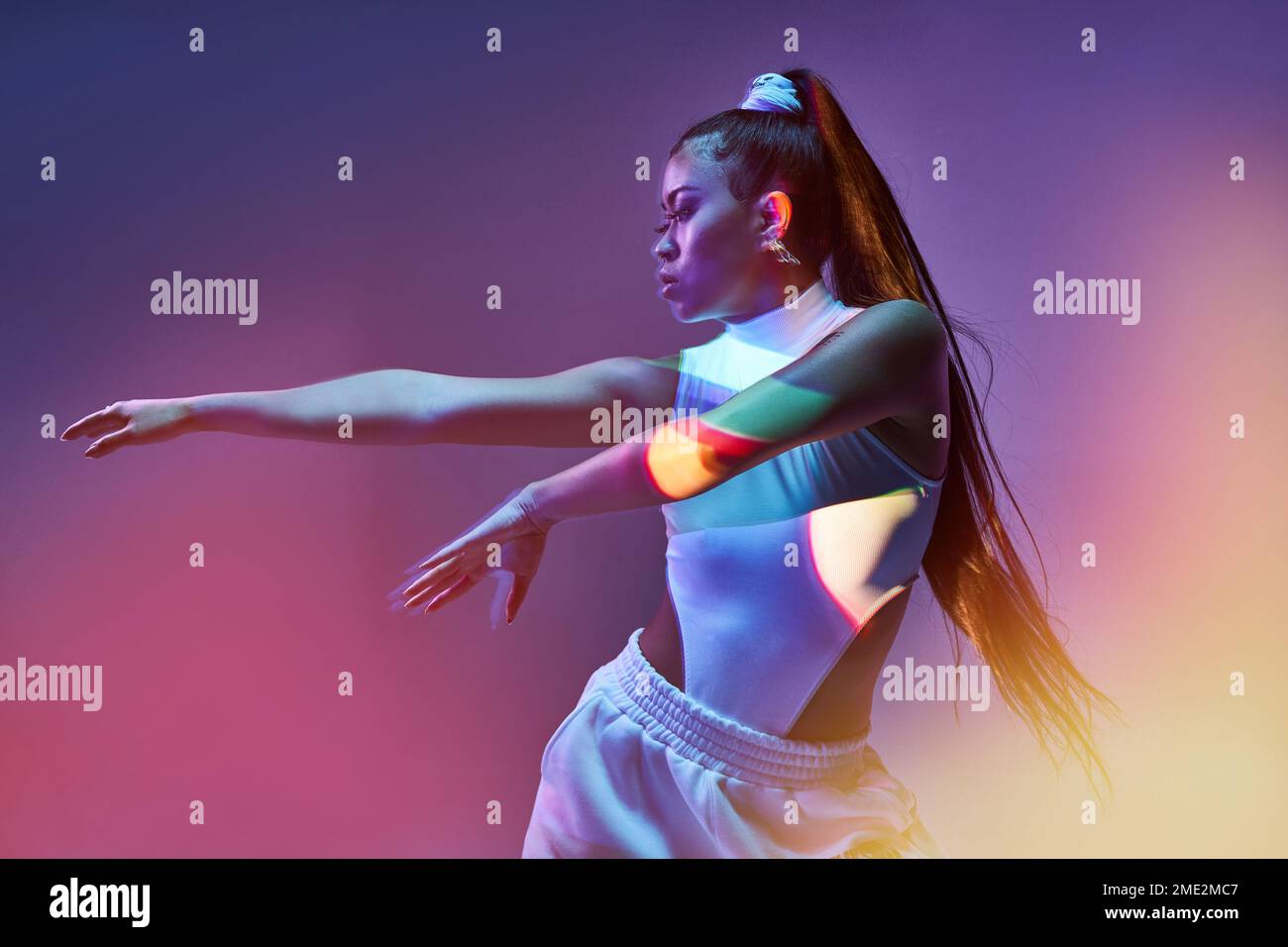 Sporty young woman in bodysuit hi-res stock photography and images - Alamy