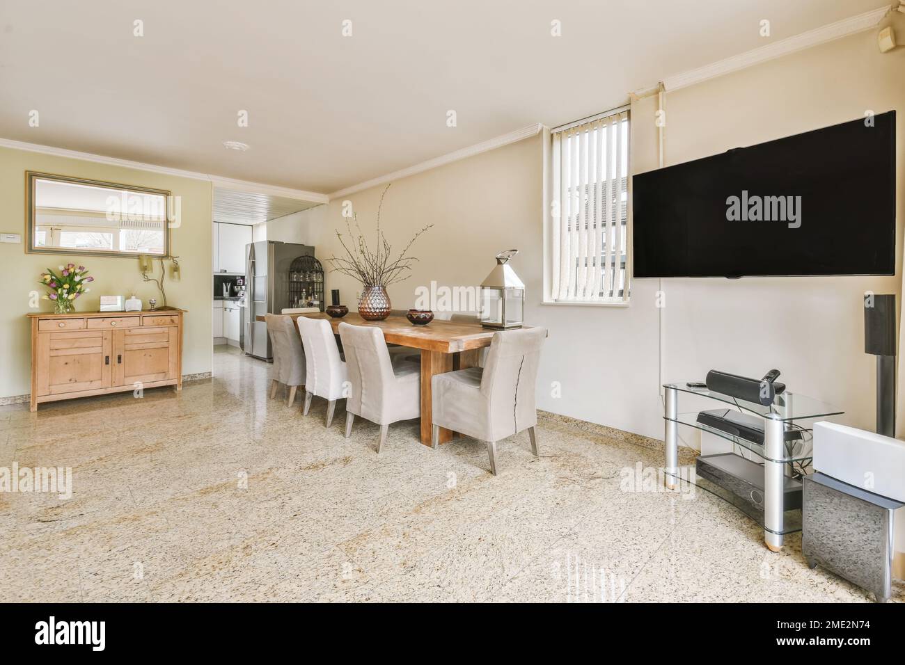 Interior design of contemporary spacious dining room with big table ...