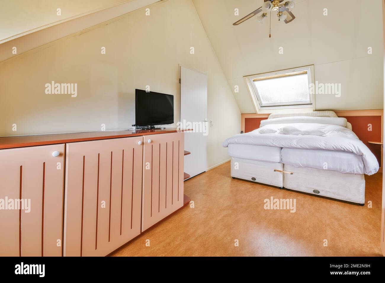 Interior design of modern bedroom on top floor of residential house ...