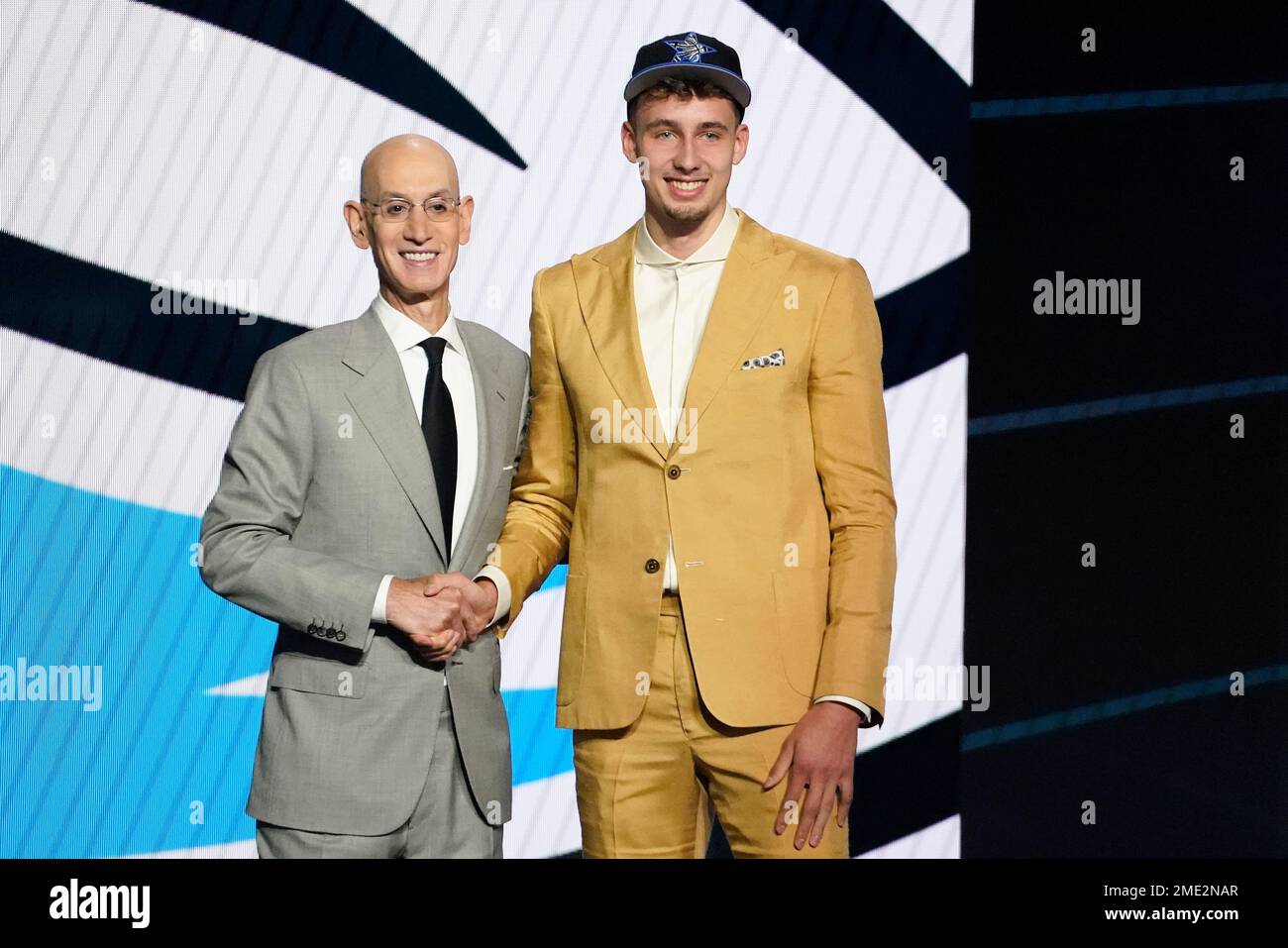 Franz Wagner, right, poses for a photo with NBA Commissioner Adam ...