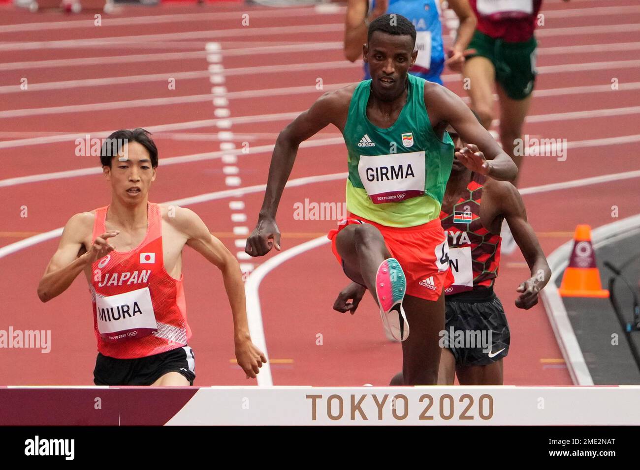 Lamecha Girma, of Ethiopia, wins in a heat of the men's 3,000-meter ...