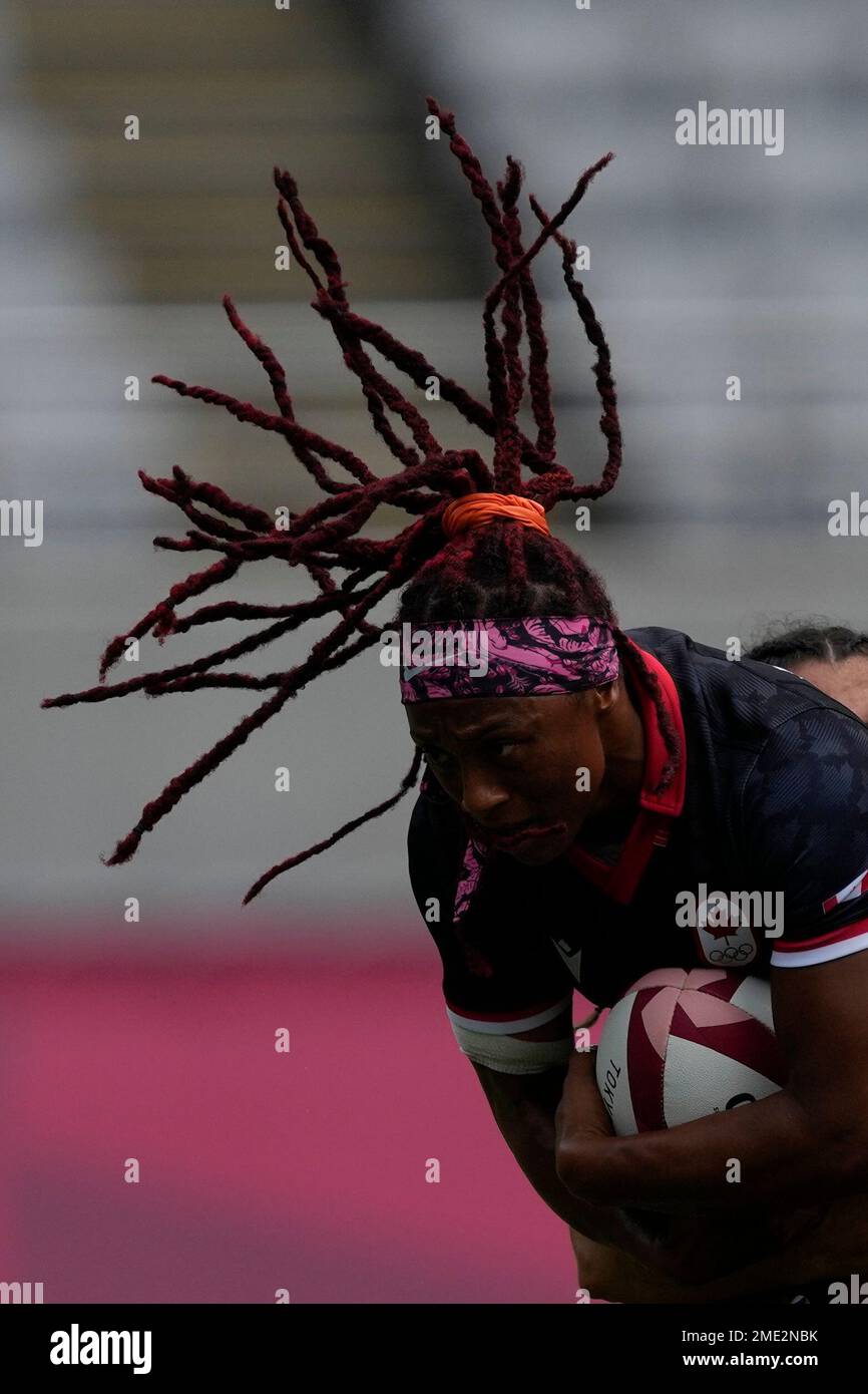 Canada's Charity Williams is tackled in Canada's women's rugby sevens ...