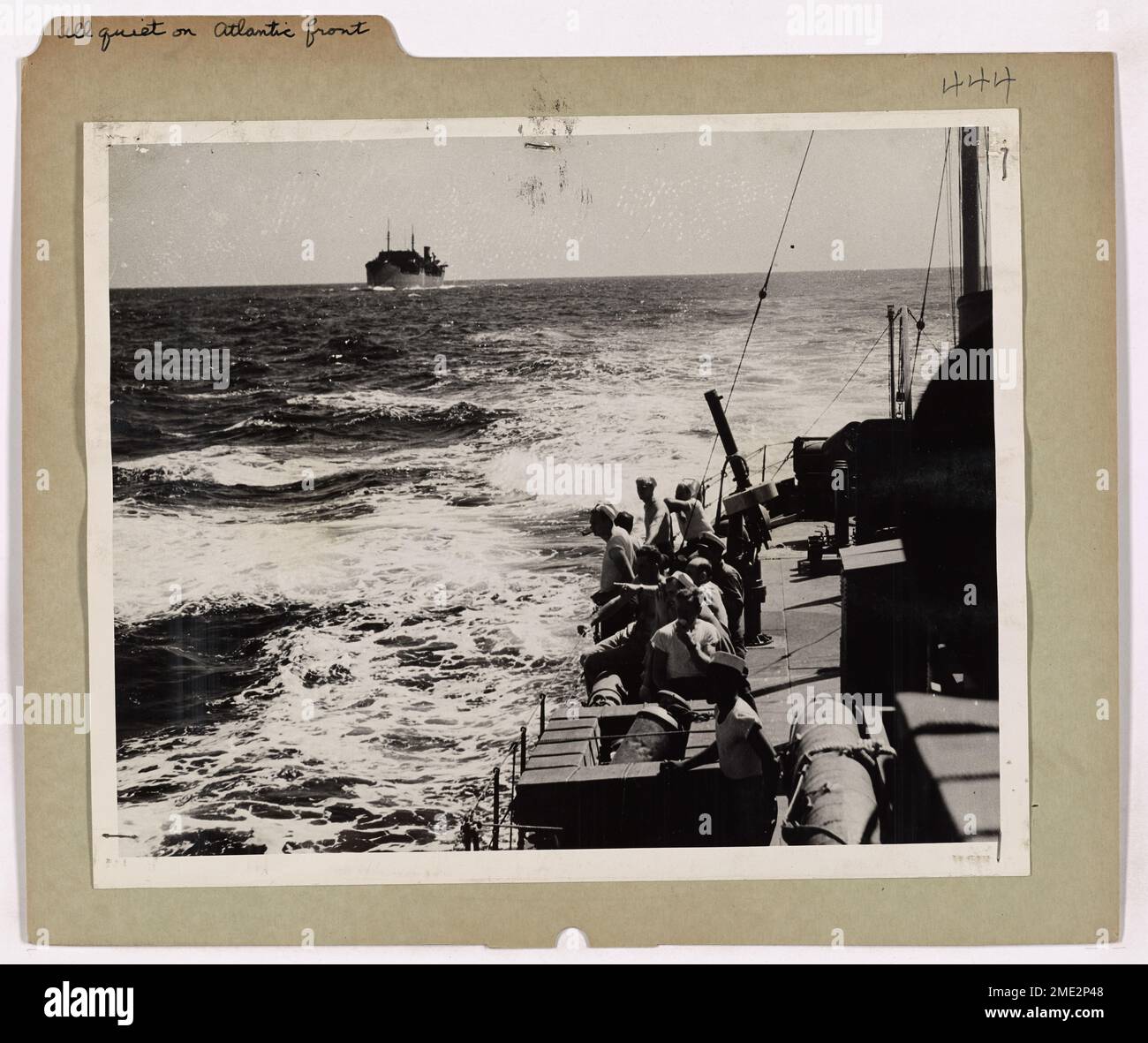 A U.S. Coast Guard cutter patrols the Atlantic, guarding a convoy of ...