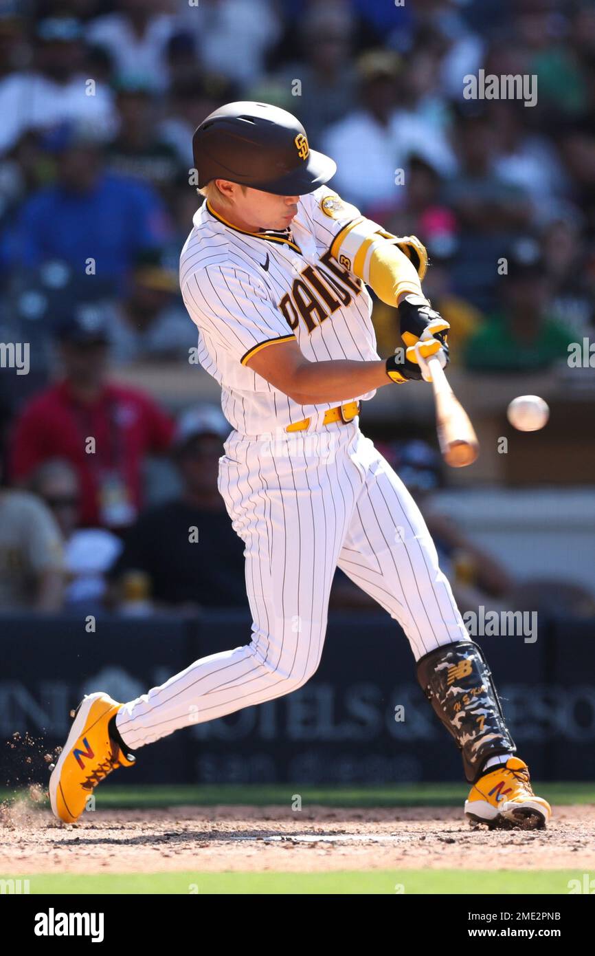 San Diego Padres' Ha-Seong Kim makes contact with a pitch during an at ...