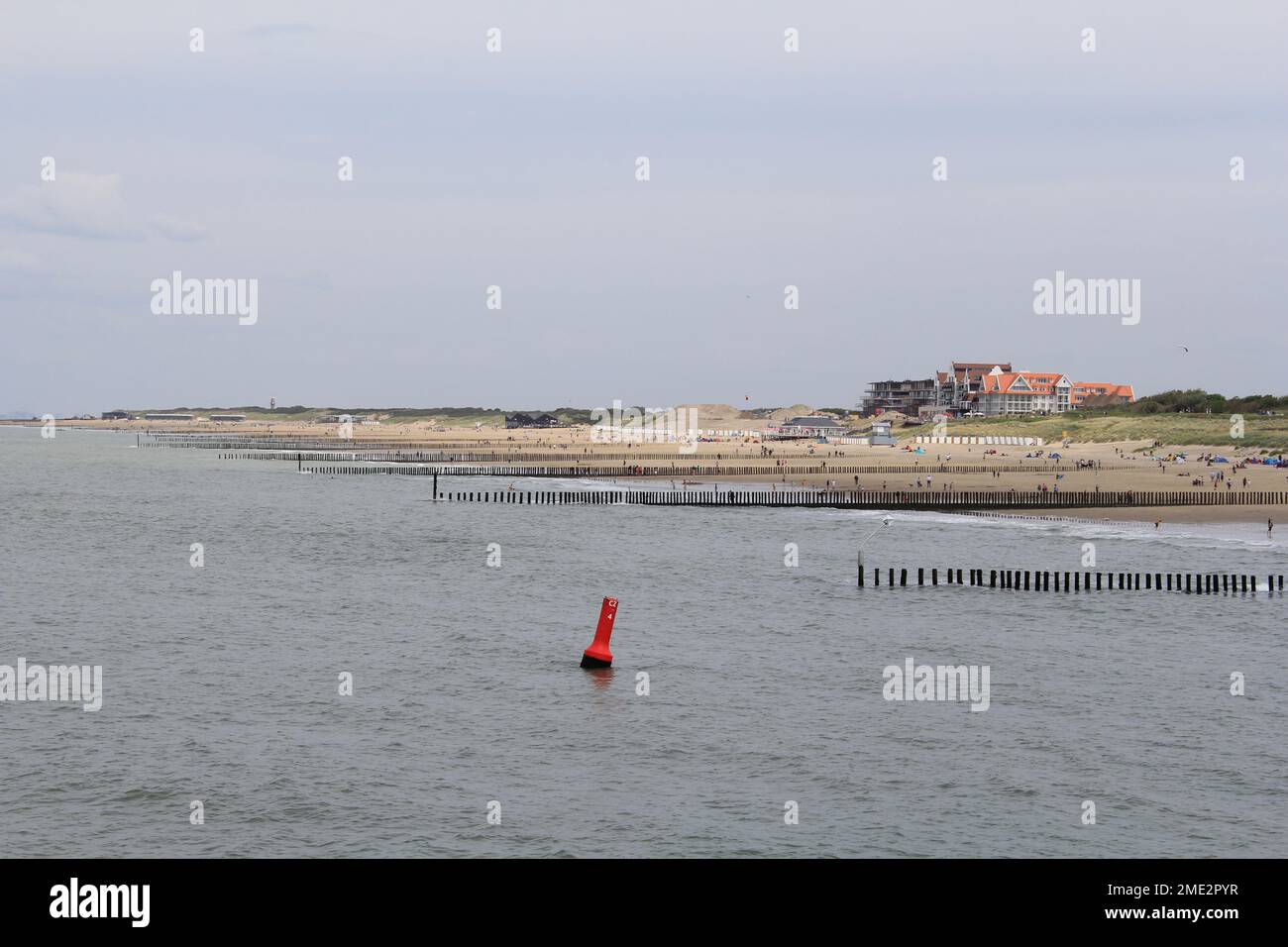 the dutch coastline of cadzand in sealand with a sand beach with ...