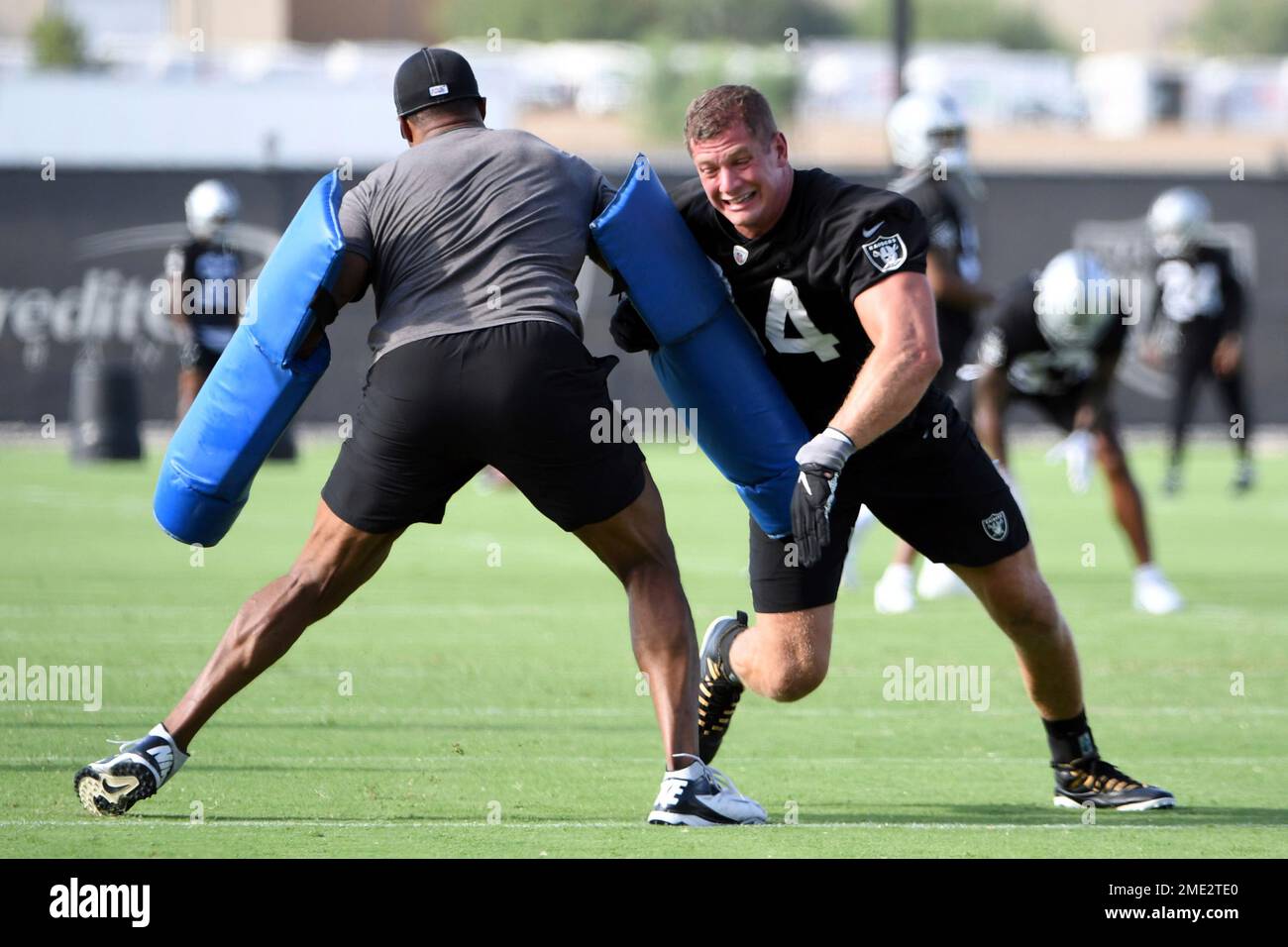 Las Vegas Raiders defensive end Carl Nassib runs a drill during an NFL ...