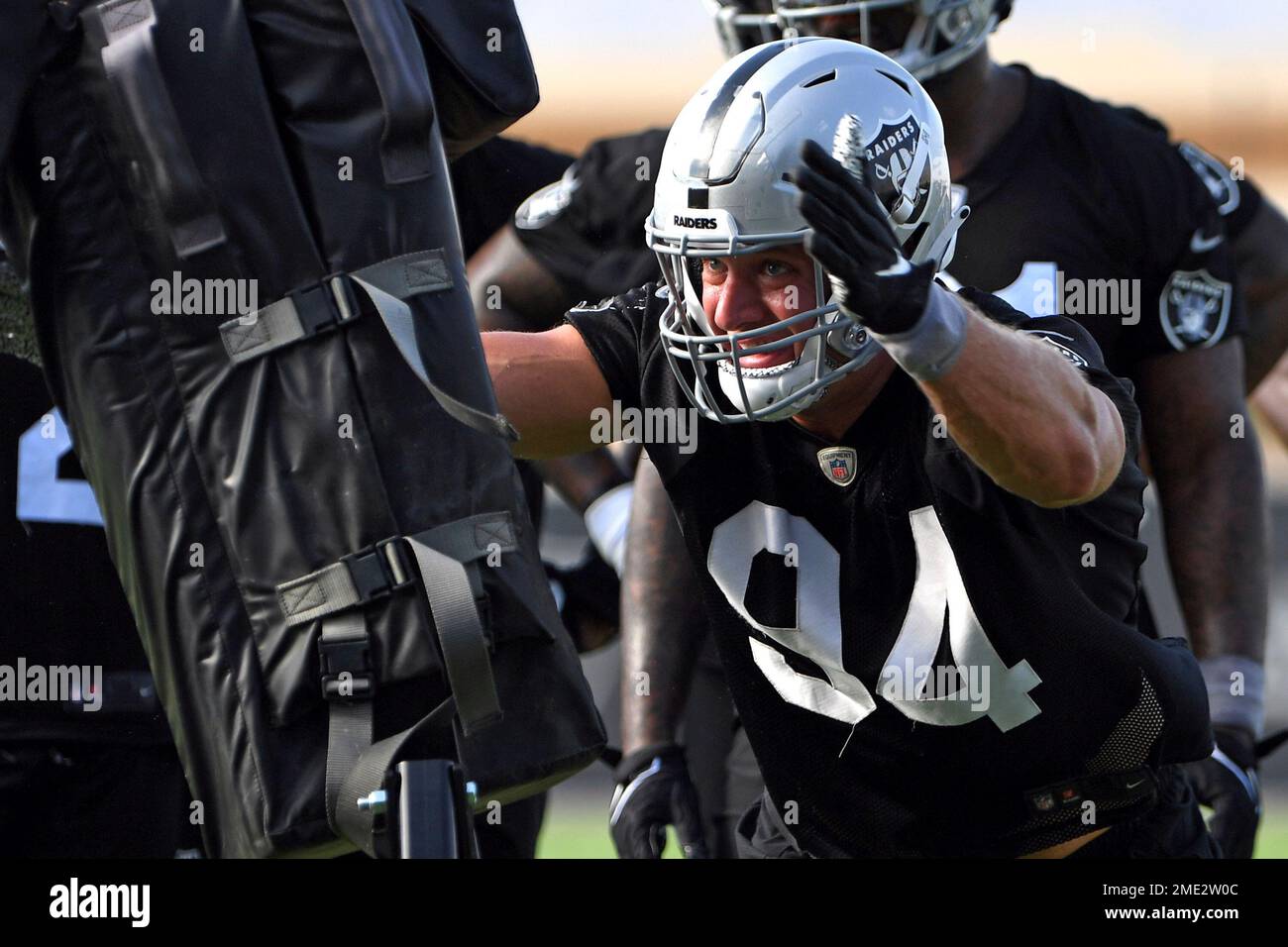 Las Vegas Raiders defensive end Carl Nassib performs a drill during an NFL football practice ...