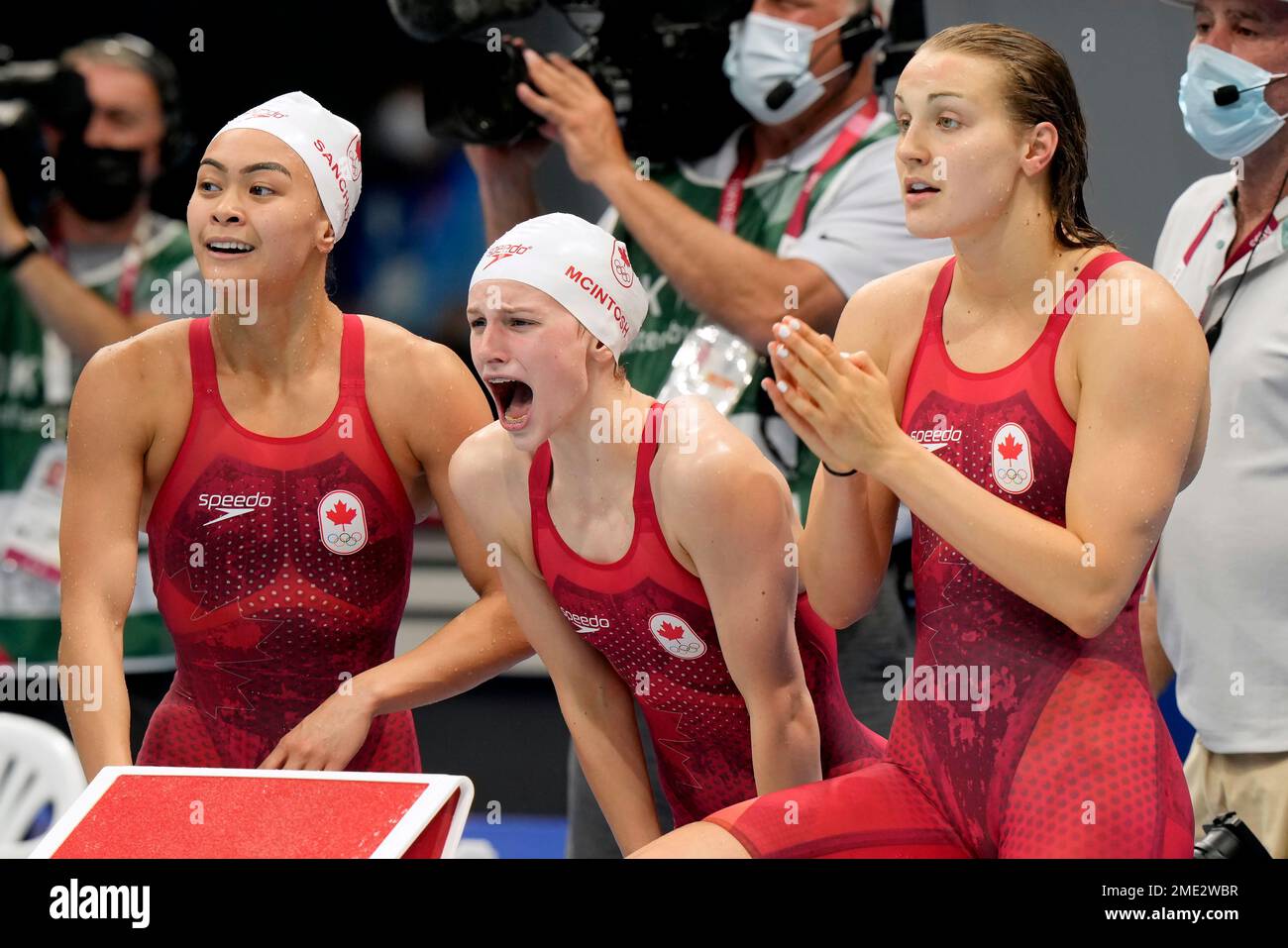 Canada's Kayla Sanchez, Summer McIntosh and Rebecca Smith, fromleft ...