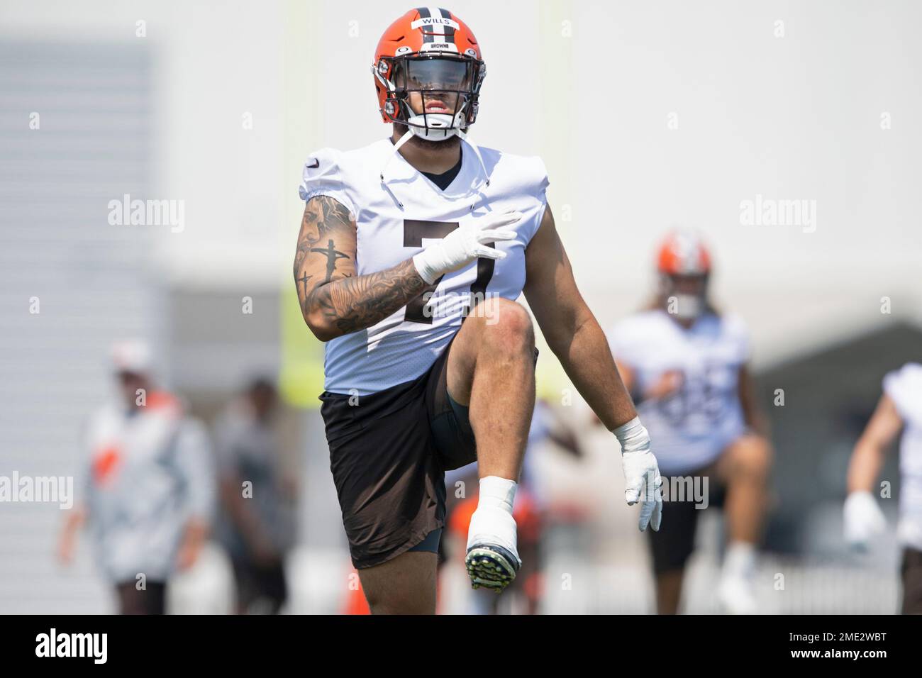 Cleveland Browns offensive linemen Jedrick Wills Jr. (71) stretches ... Cleveland Browns offensive linemen Jedrick Wills Jr. (71) stretches ...