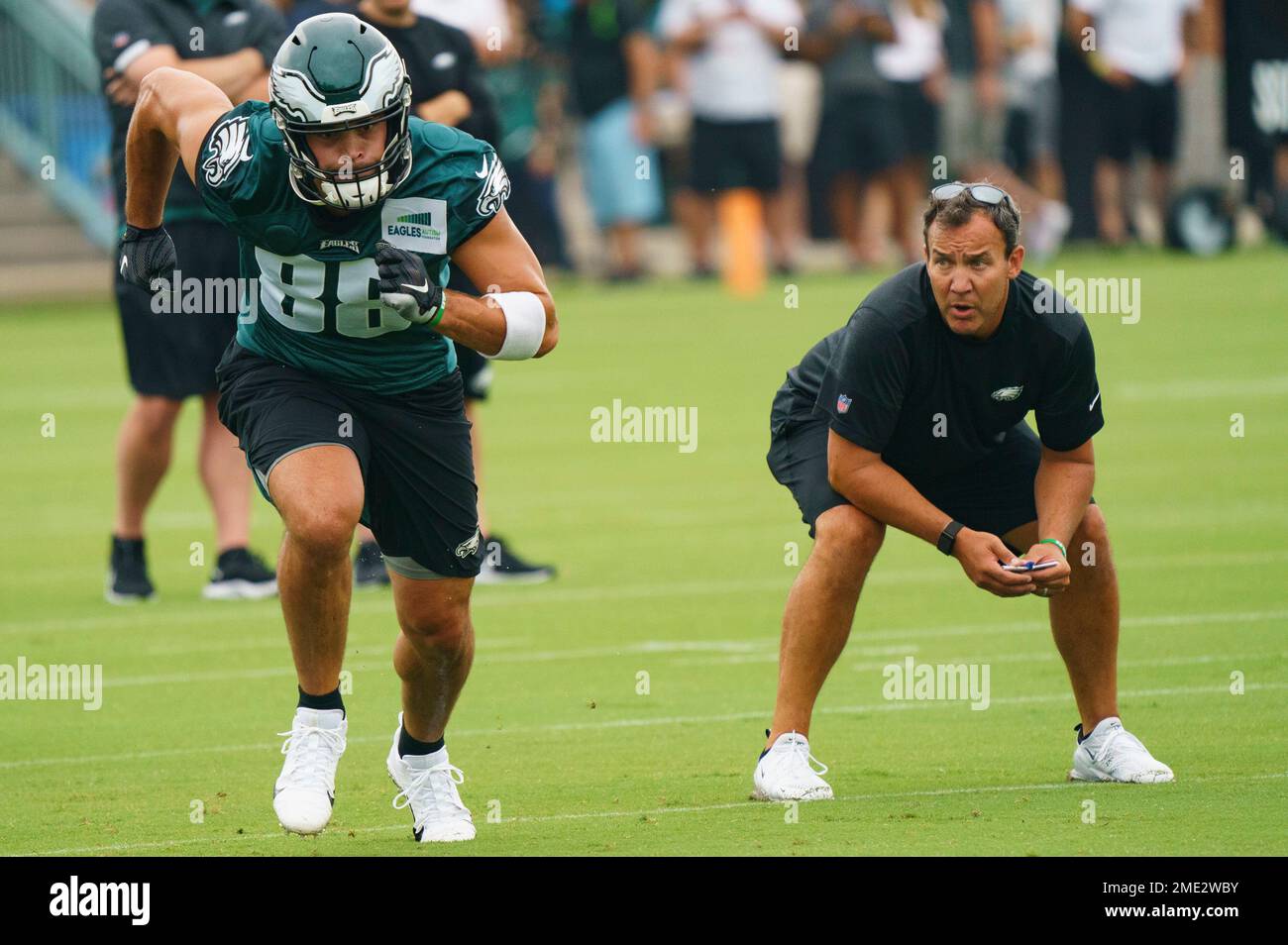 Philadelphia Eagles tight end Dallas Goedert, left, runs a drill as ...