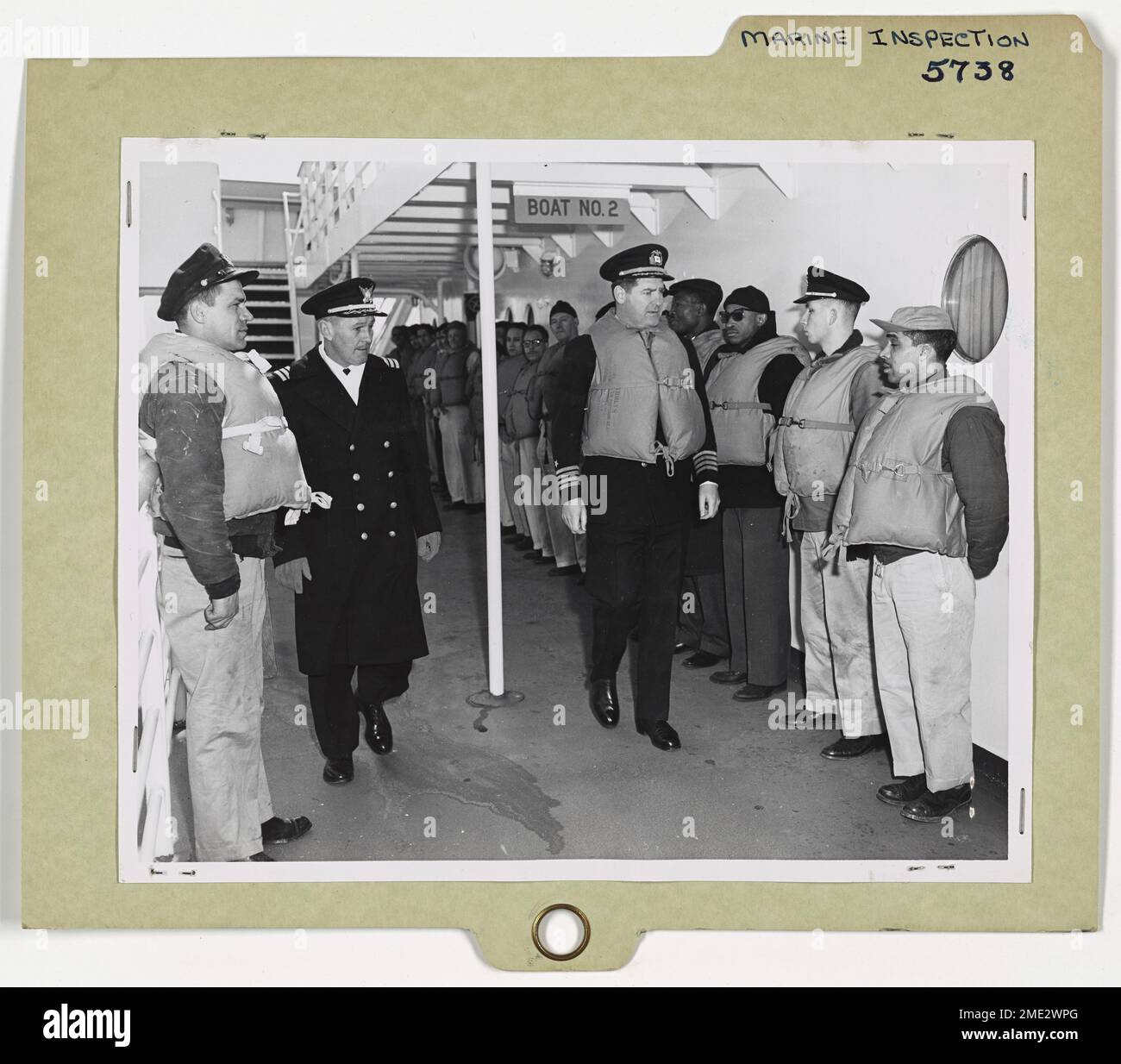 A U.S. Coast Guard inspector observes the captain of an ocean liner ...