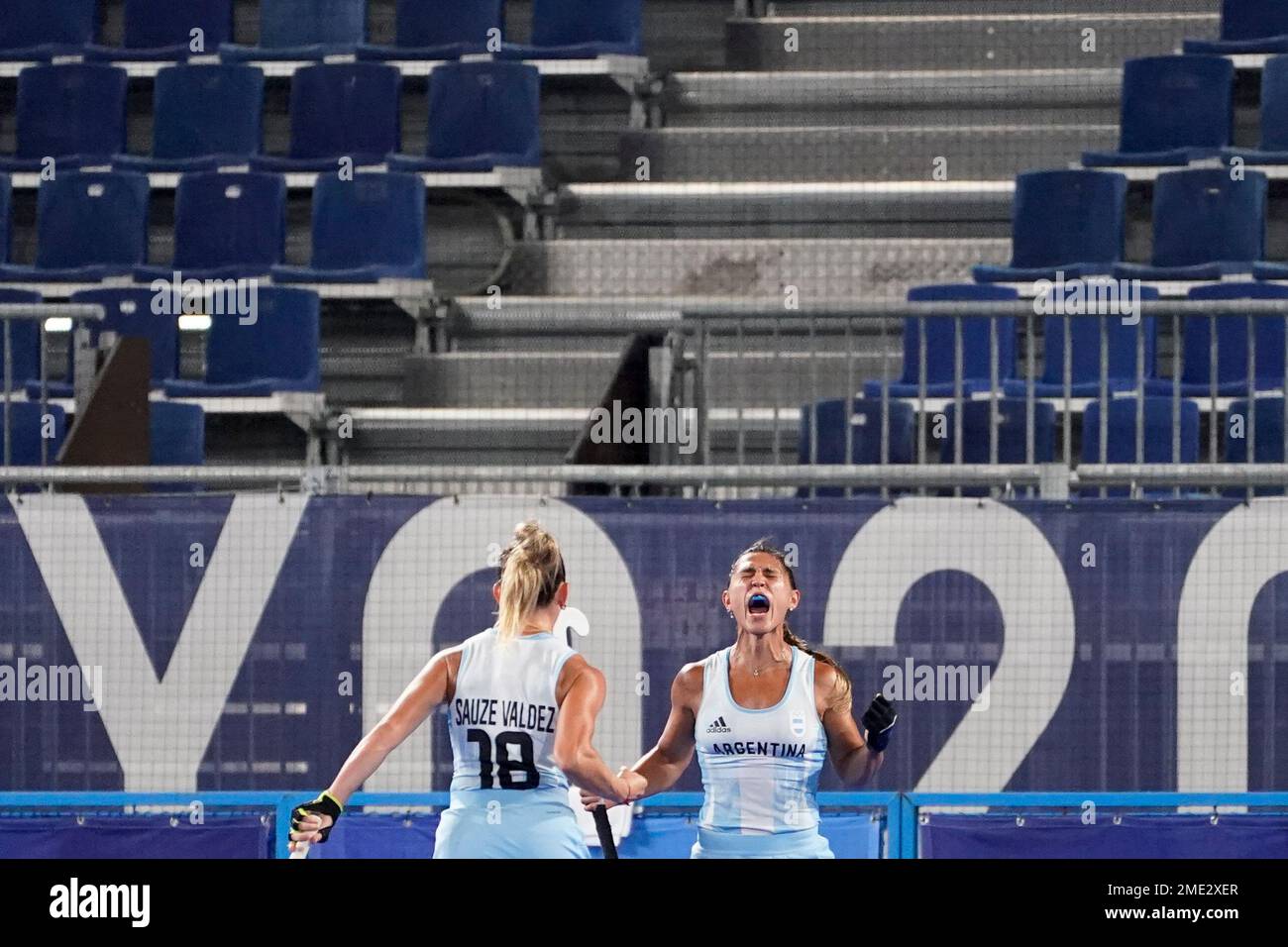 Argentina's Agustina Gorzelany, right, reacts after scoring to an ...