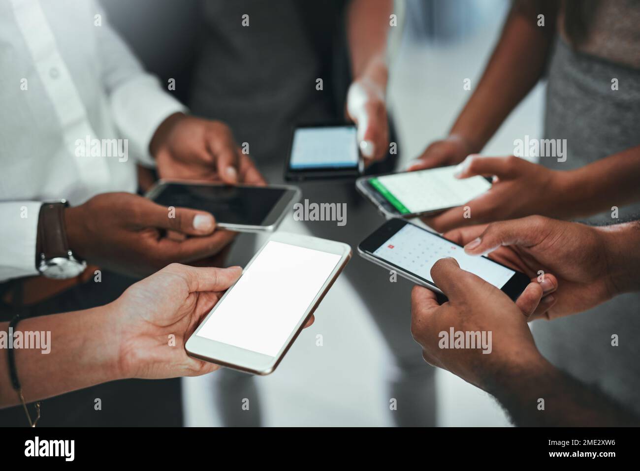 One of the smartest tools in business. a group of businesspeople using ...