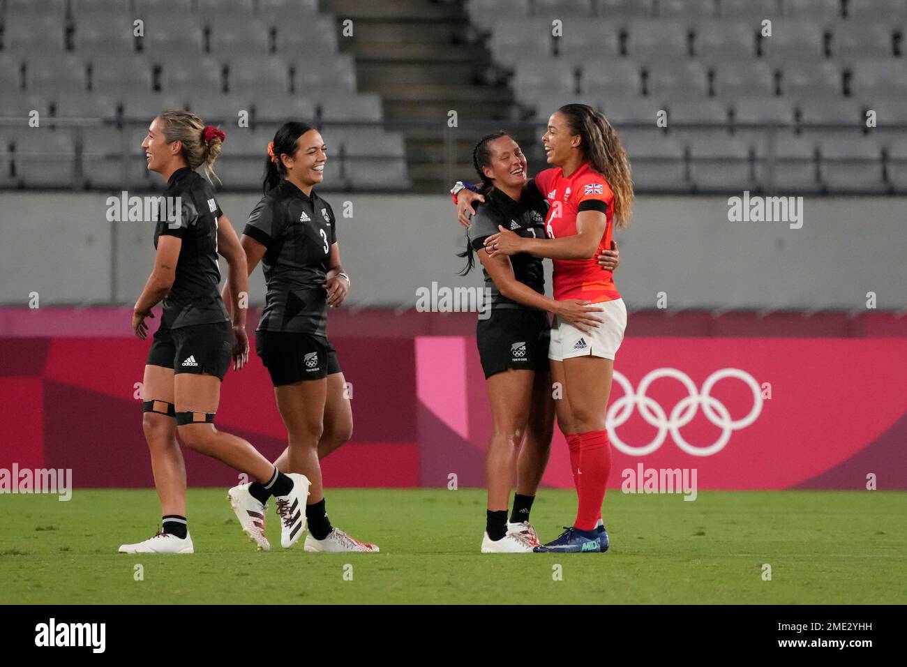 Britain's Deborah Fleming, right, hugs New Zealand's Tyla Nathan-Wong ...