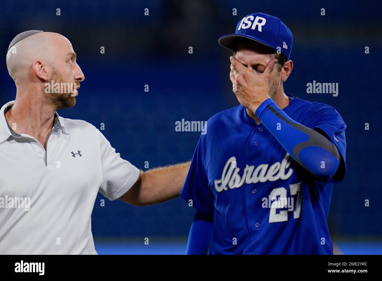 Israel pitcher Jonathan Moscot is taken out during the first inning of ...