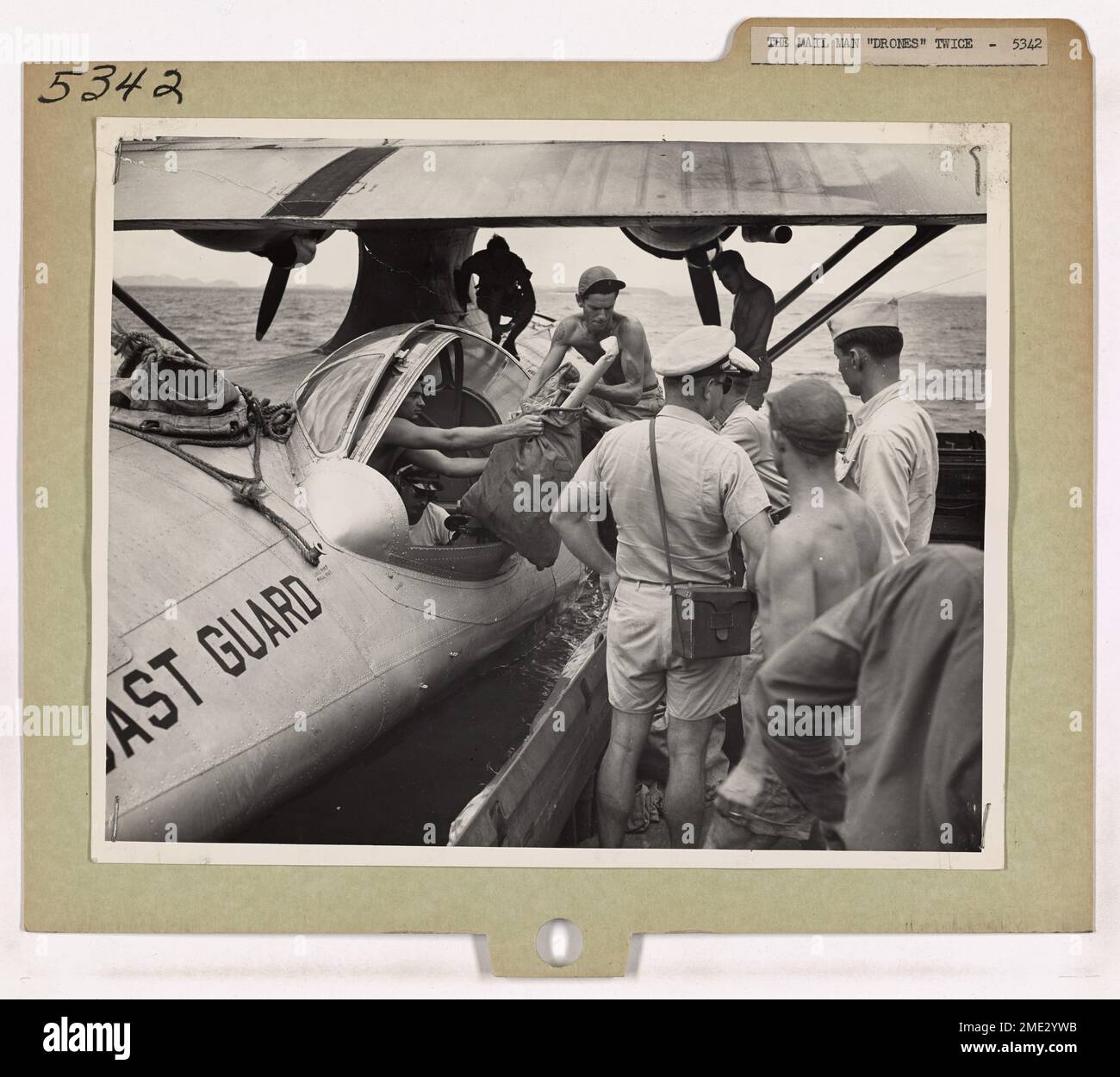 This image shows the delivery of mail to Coast Guard personnel. The ...