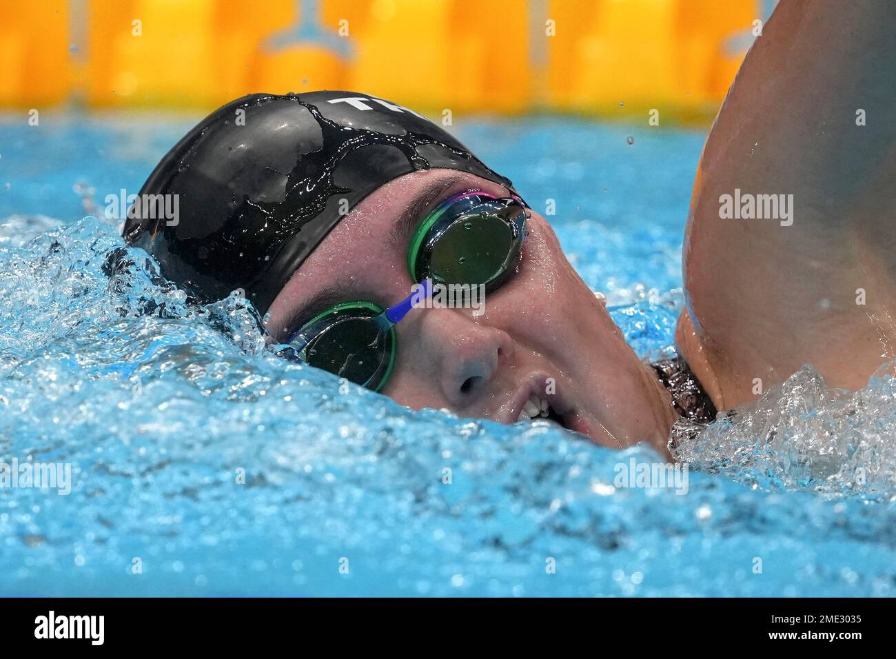 Eve Thomas of New Zealand swims in a heat of the women's 800-meter ...