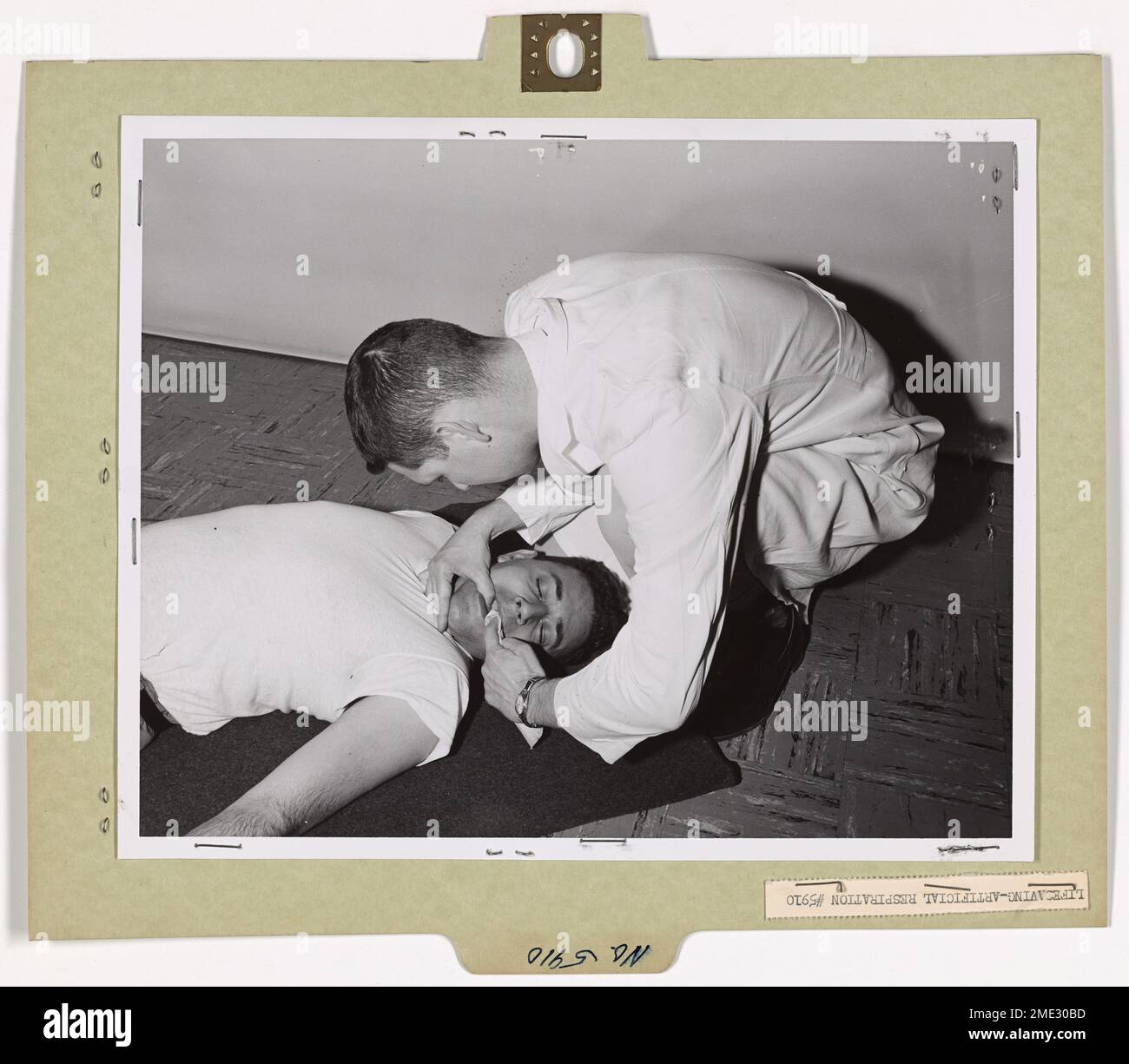 This image shows the procedure for mouth-to-mouth resuscitation, where ...