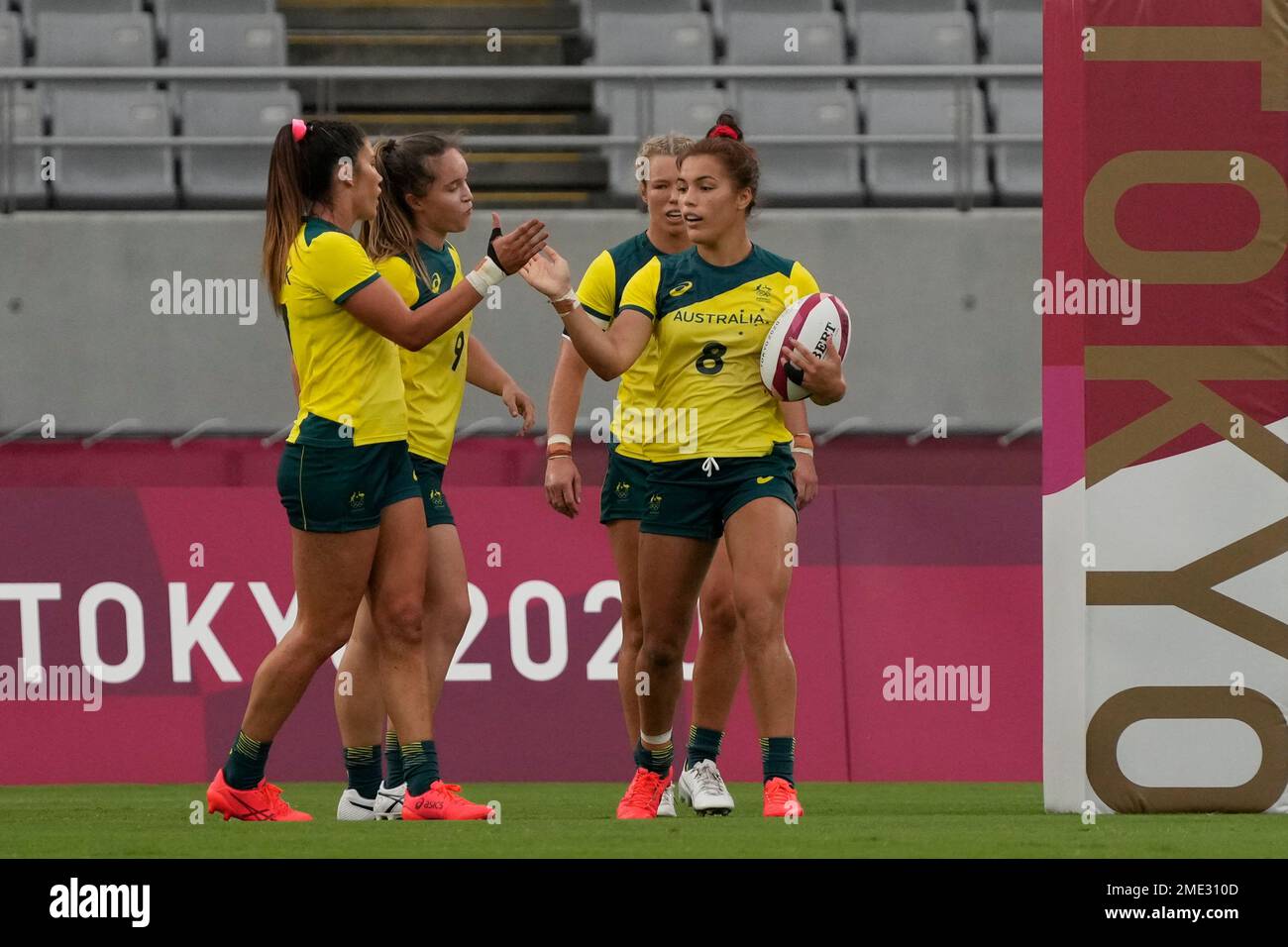 Australia's Madison Ashby, right, celebrates with teammates after ...