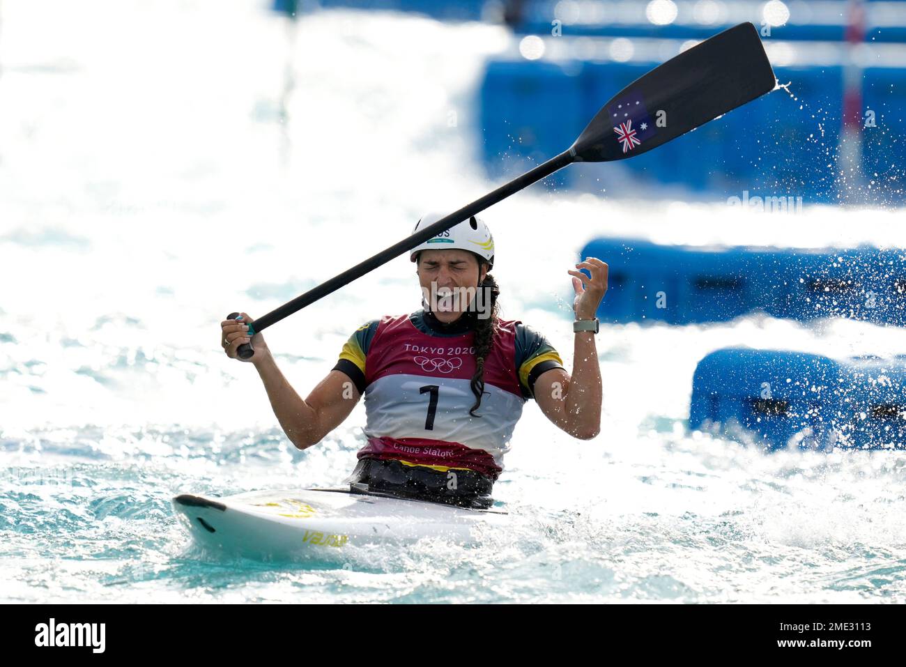 Jessica Fox of Australia celebrates as she crosses the finish line to ...