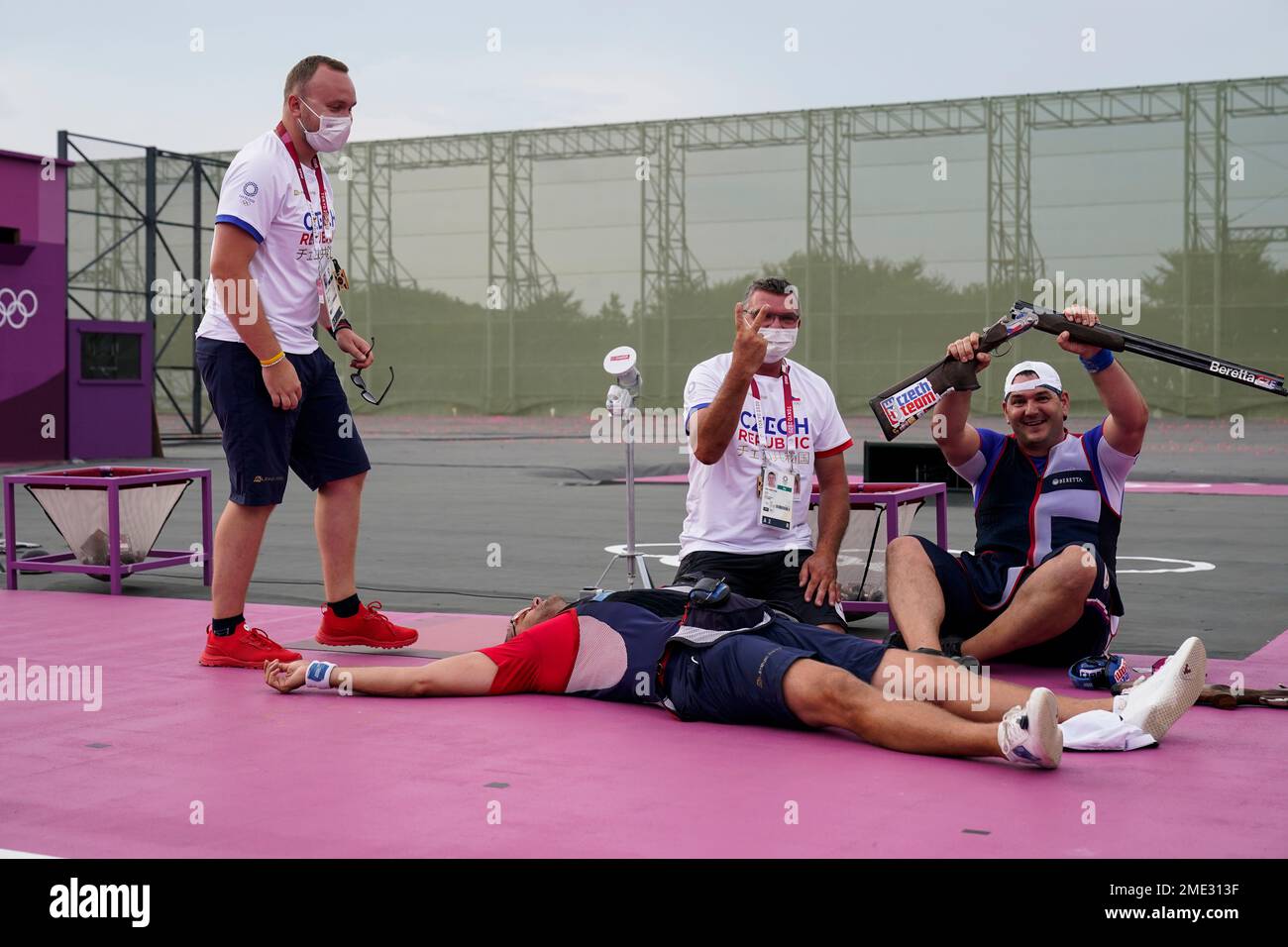 Silver medalist David Kostelecky, laying left, and gold medalist Jiri ...