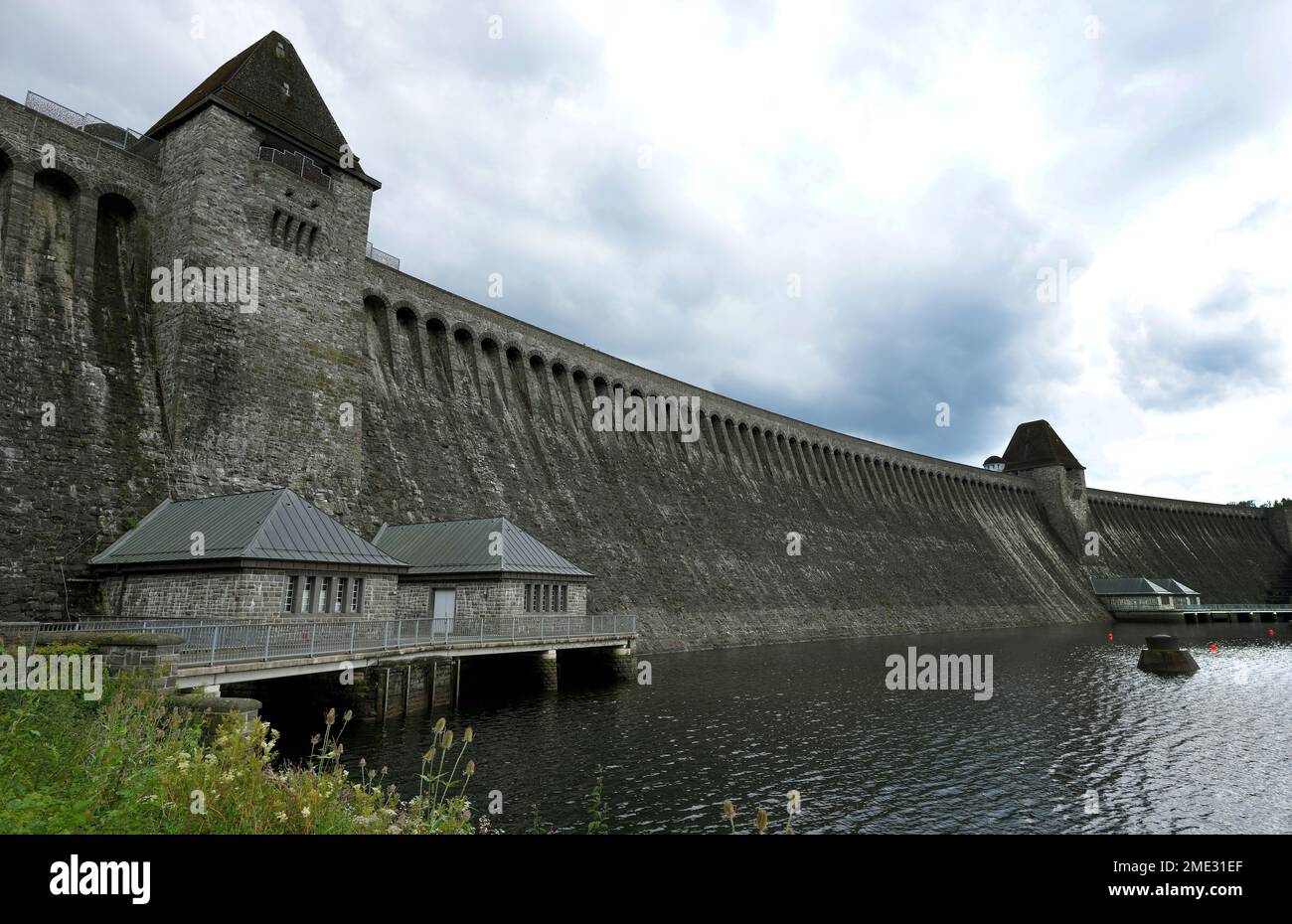 The dam wall of the Moehnesee (Lake Moehne) dam is seen in Moehnesee ...