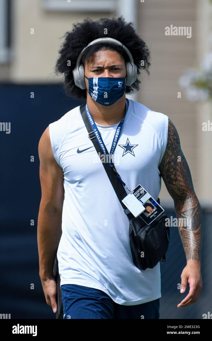 Dallas Cowboys linebacker Anthony Hines III wears a mask inside the ...