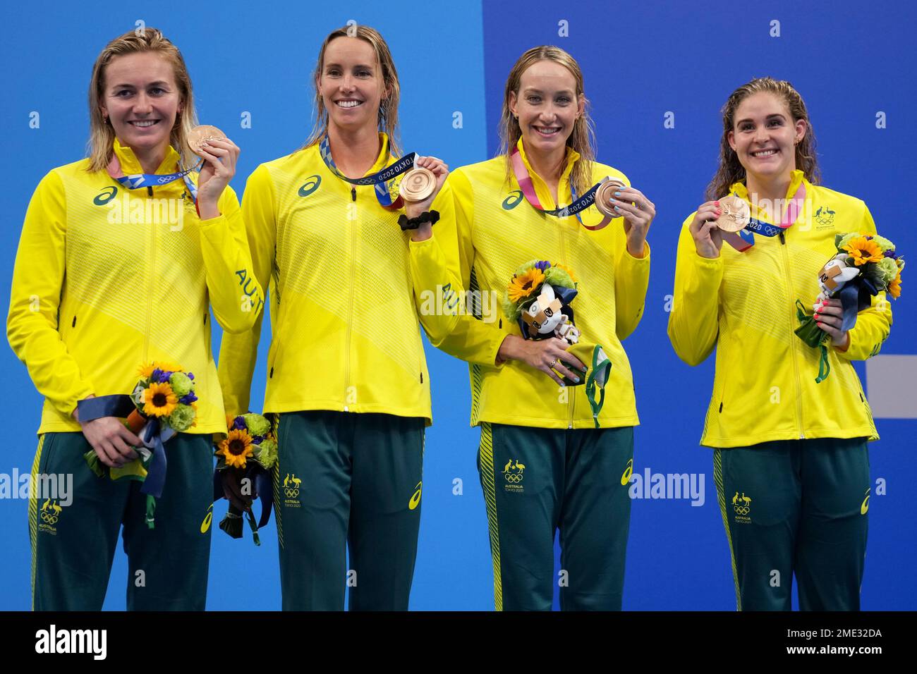 Australia's women's 4x200-meter freestyle relay team pose on the podium with their bronze medals ...