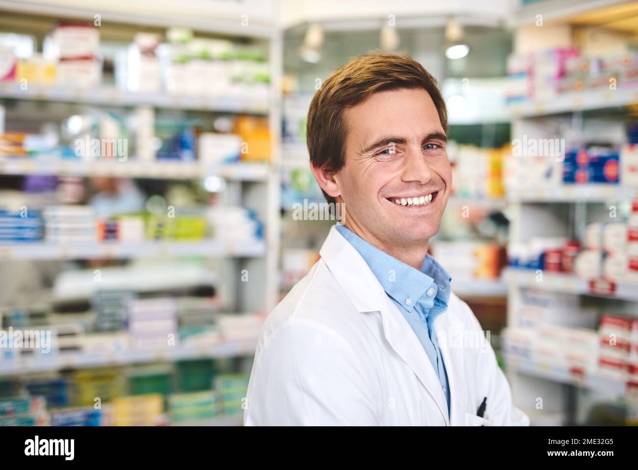 Portrait handsome young pharmacist chemist hi-res stock photography and ...