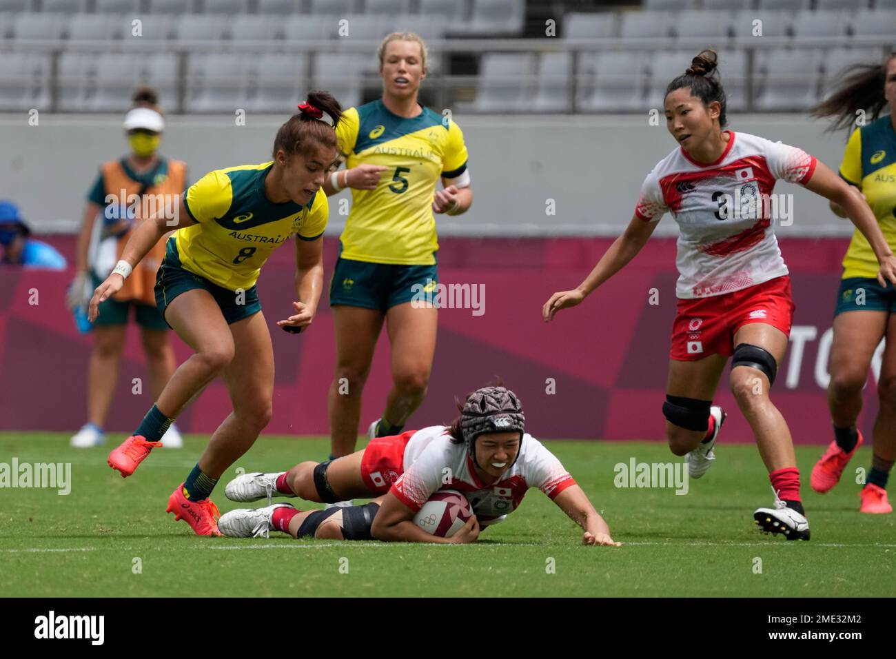 Japan's Raichel Bativakalolo lies on the ball as Australia's Madison ...