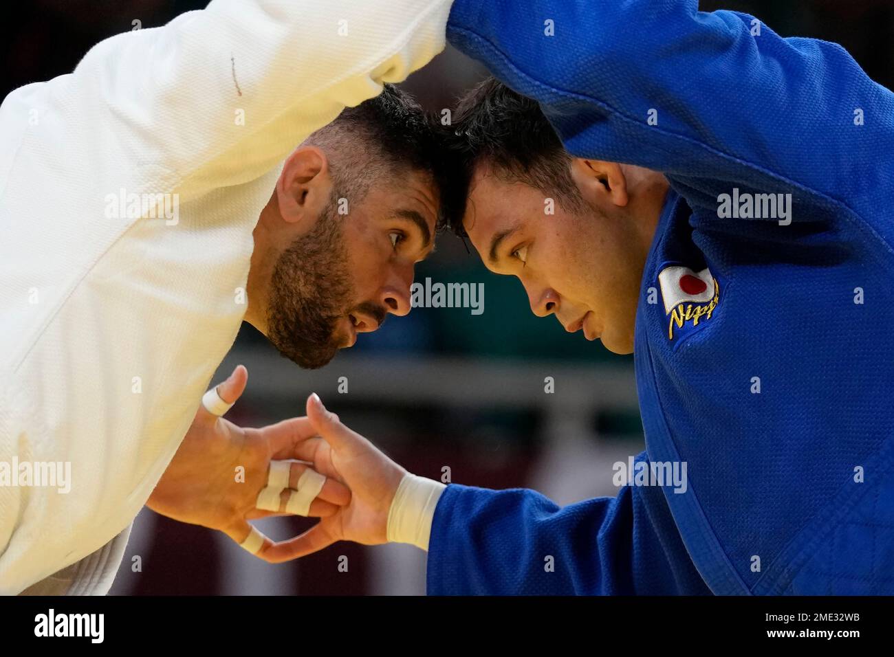 Peter Paltchik of Israel, left, and Aaron Wolf of Japan compete in the ...