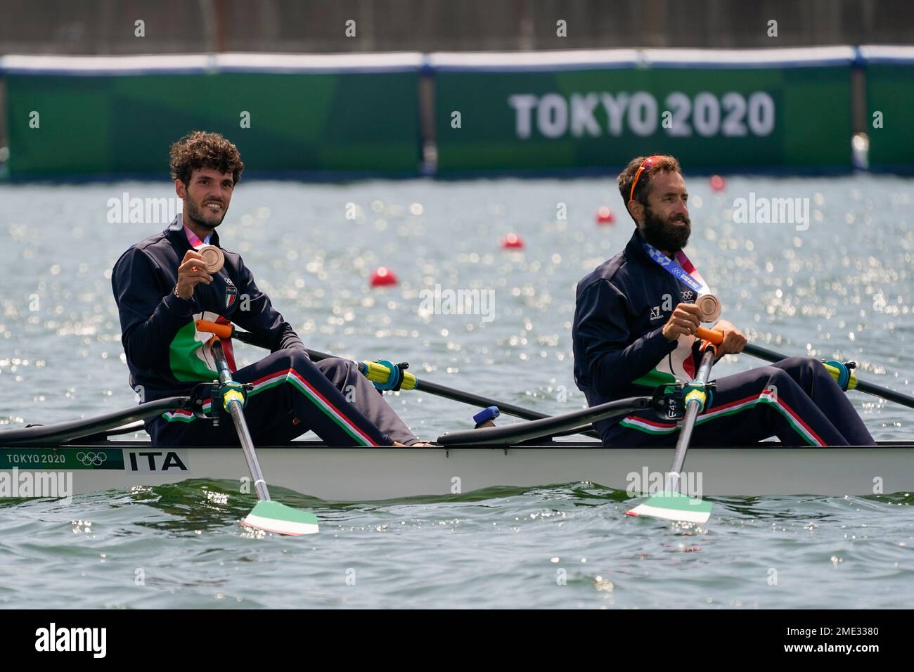 Stefano Oppo and Pietro Ruta of Italy pose with their bronze medals after competing in the ...