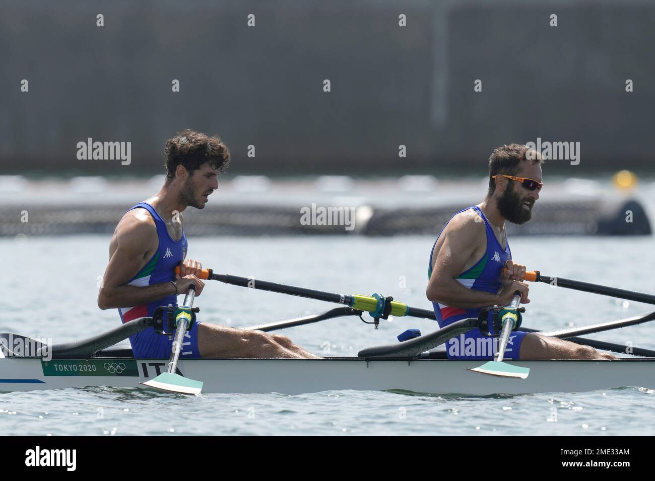 Stefano Oppo and Pietro Ruta of Italy cross the finish line in the lightweight men's rowing ...