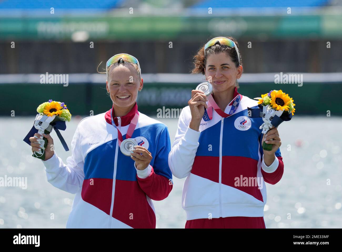 Vasilisa Stepanova and Elena Oriabinskaia of the Russian Olympic Committee pose with their ...