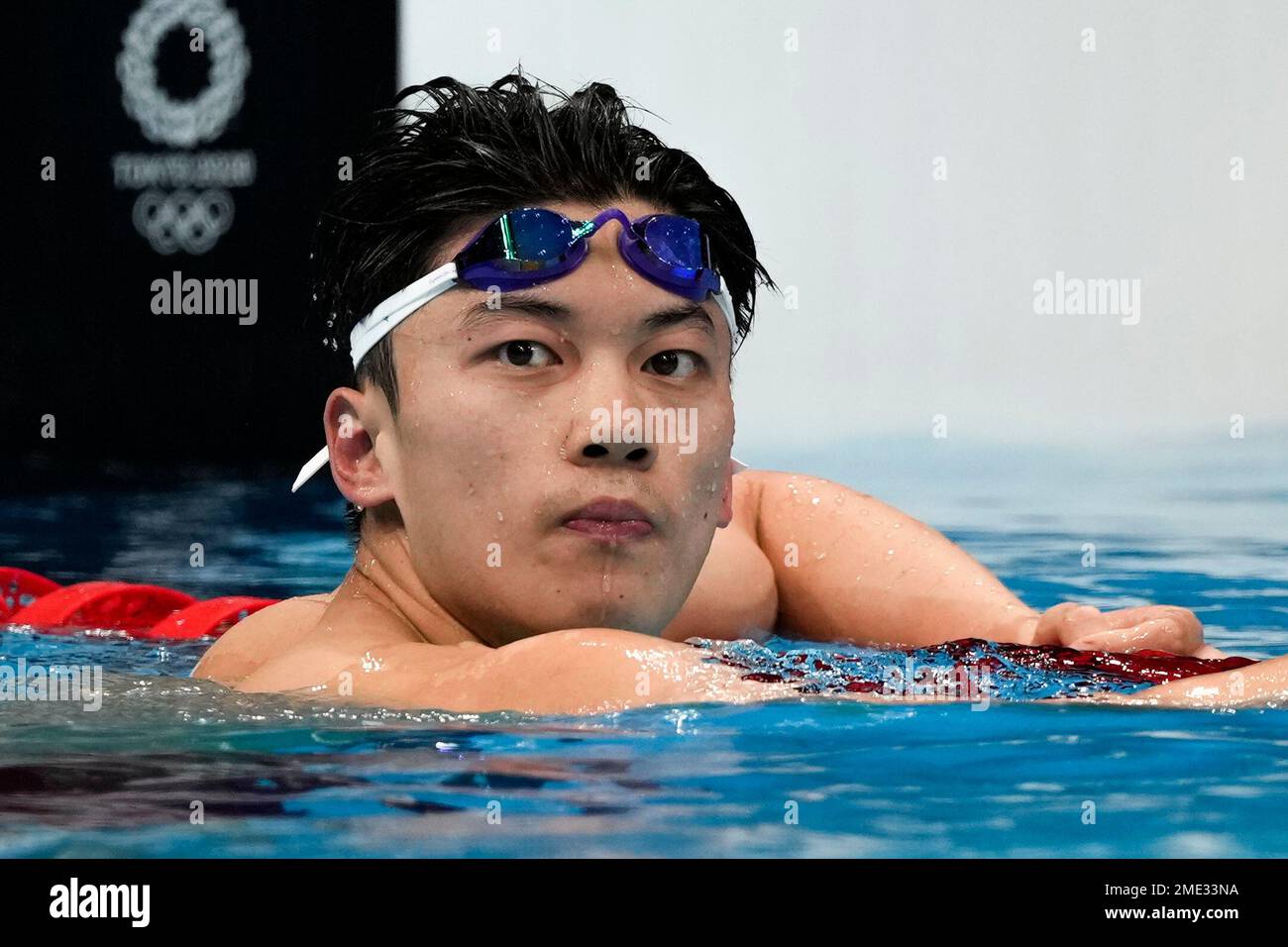 Wang Shun, of China, reacts after winning a men's 200-meter individual ...