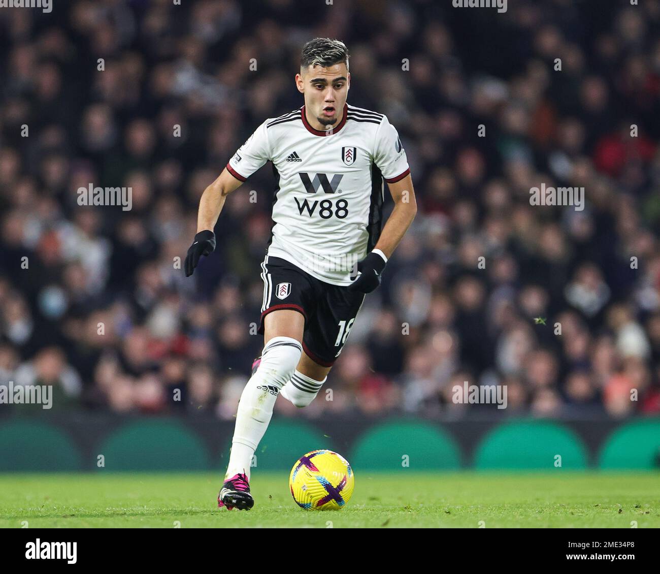 Andreas Pereira #18 of Fulham makes a break with the ball during the ...