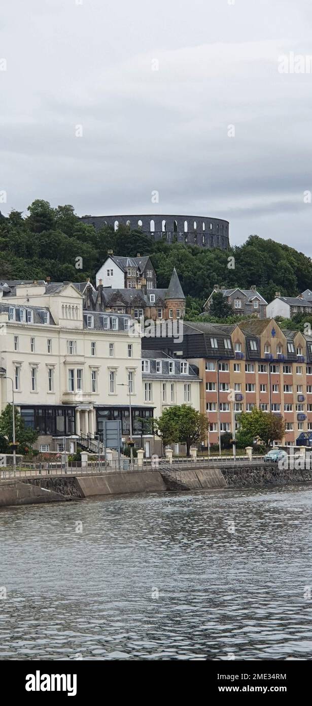 Vertical shot of typical waterfront buildings in Oban, Scotland Stock ...