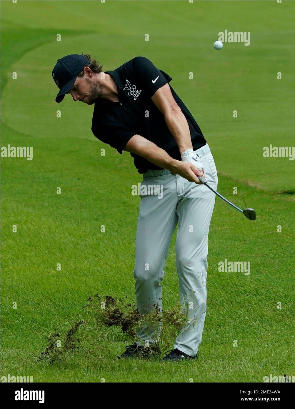 Belgium's Thomas Pieters chips onto the 15th green during the first ...