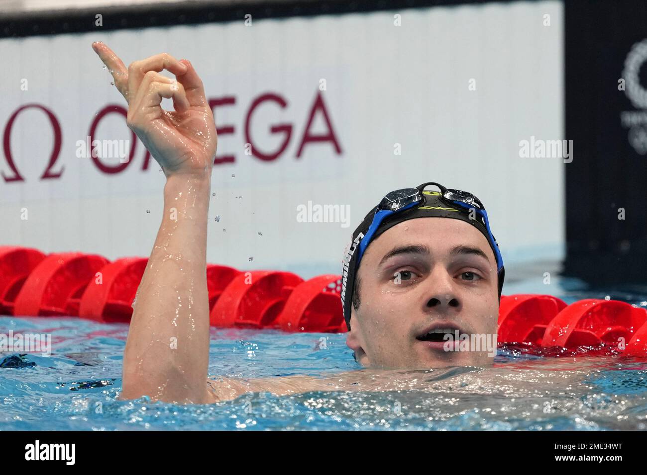 Arno Kamminga of the Netherlands waves after the men's 200-meter ...