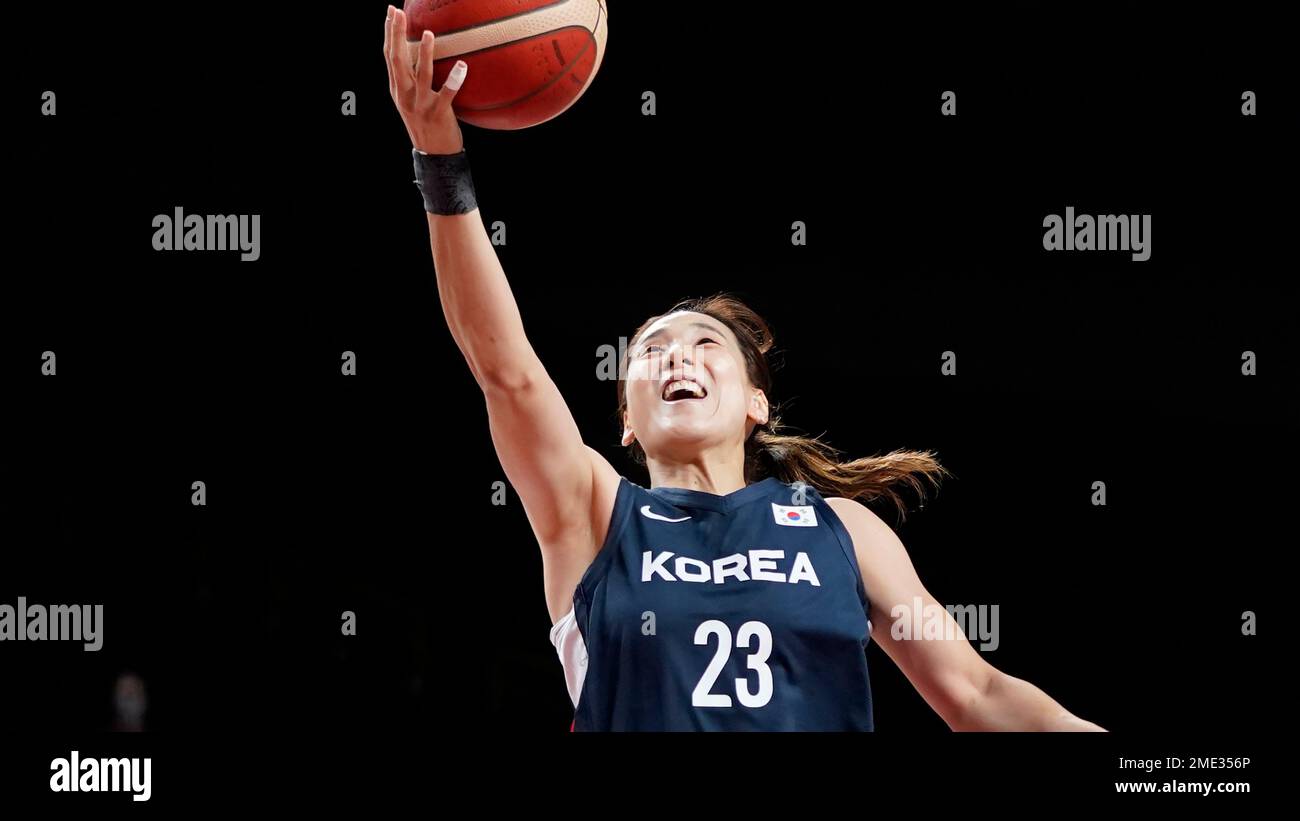 South Korea's Danbi Kim (23) drives to the basket ahead of South Korea's Heji An (5) during ...