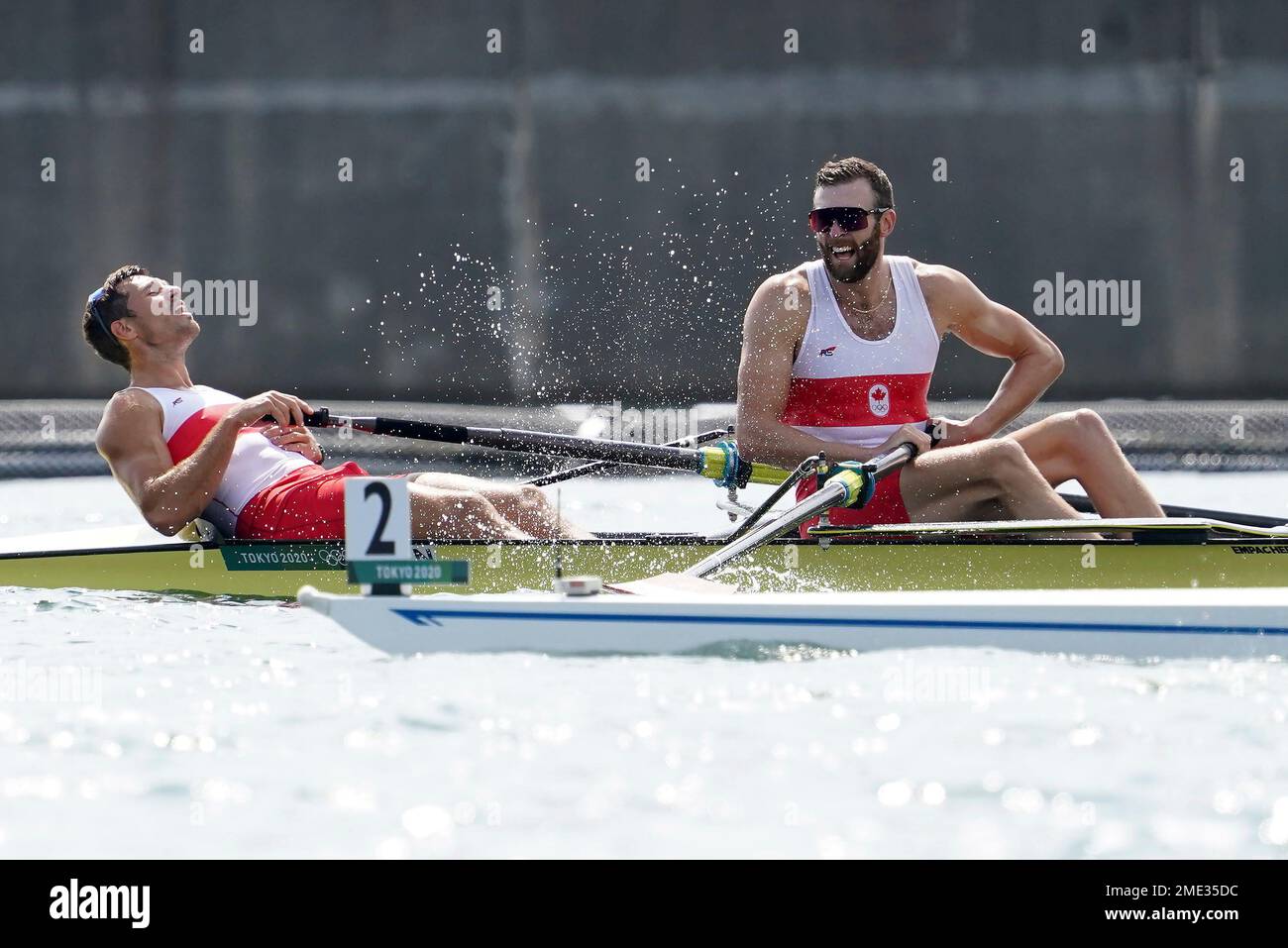 Canada's Kai Langerfeld and Conlin McCabe react after competing in the ...