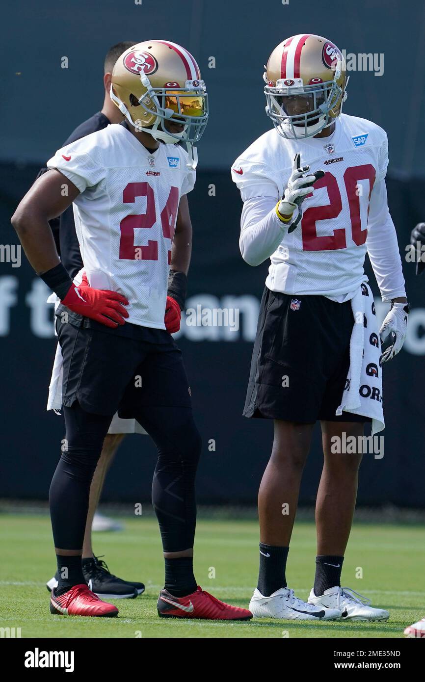San Francisco 49ers' K'Waun Williams, left, talks with Ambry Thomas at NFL football training ...