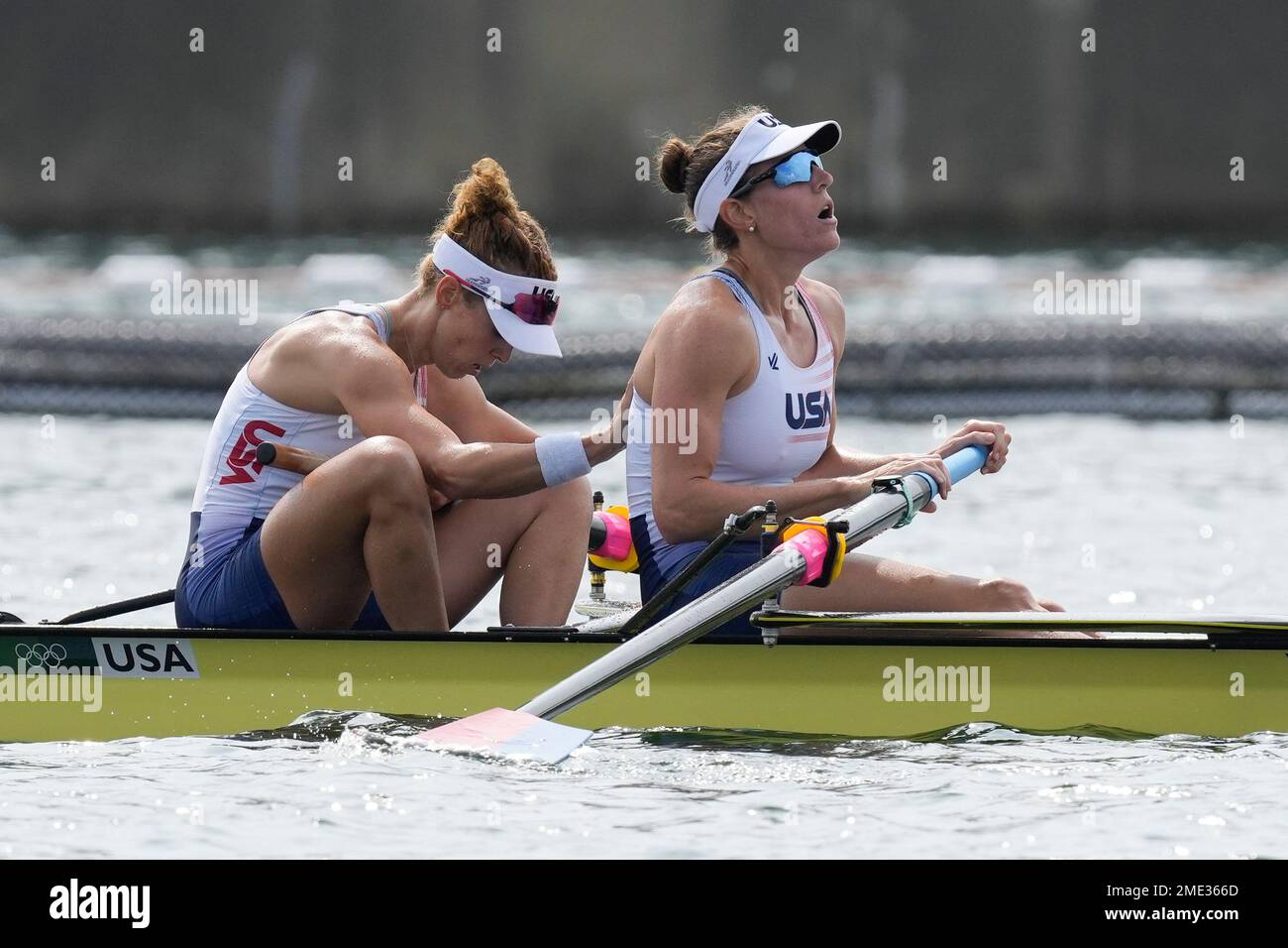 Megan Kalmoe and Tracy Eisser of the United States react after ...