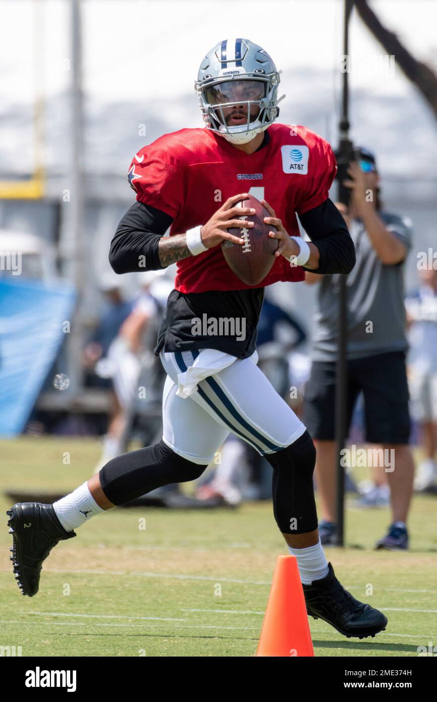 Dallas Cowboys quarterback Dak Prescott rolls out during practice at ...