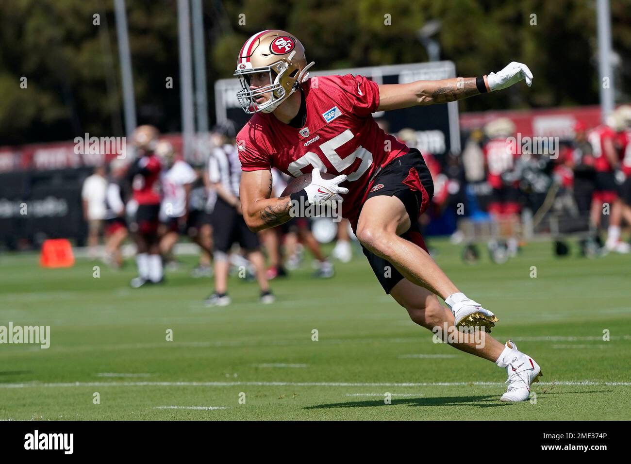 San Francisco 49ers tight end George Kittle runs after catching a pass ...