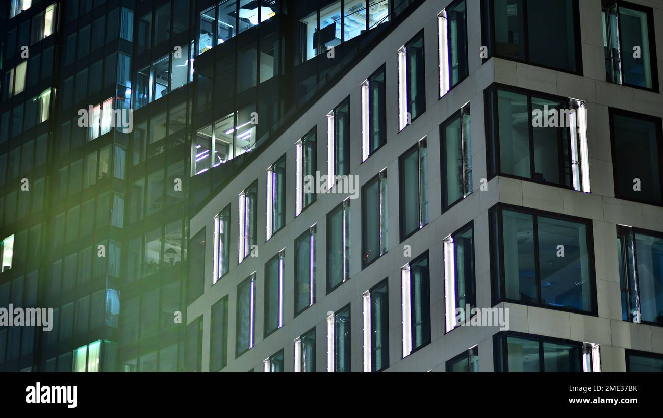 Modern office building in city at the night. View on illuminated ...